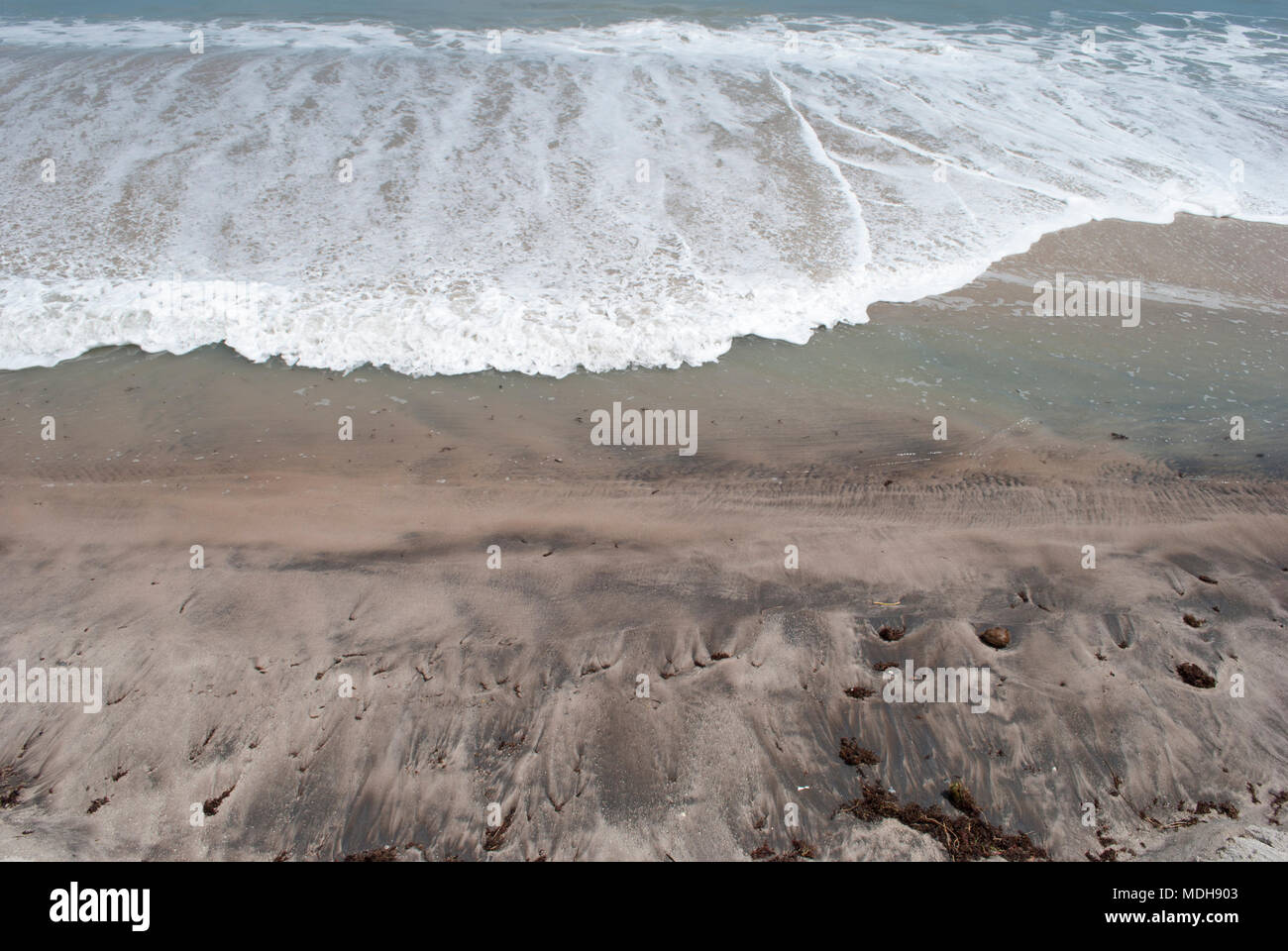 Ocean shore. Ocean view landmark. Beach home. Waves and sandy shore ...