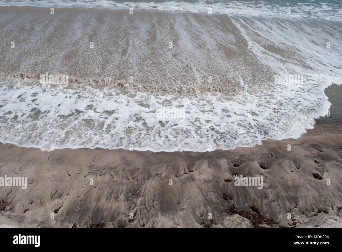 Ocean shore. Ocean view landmark. Beach home. Waves and sandy shore ...