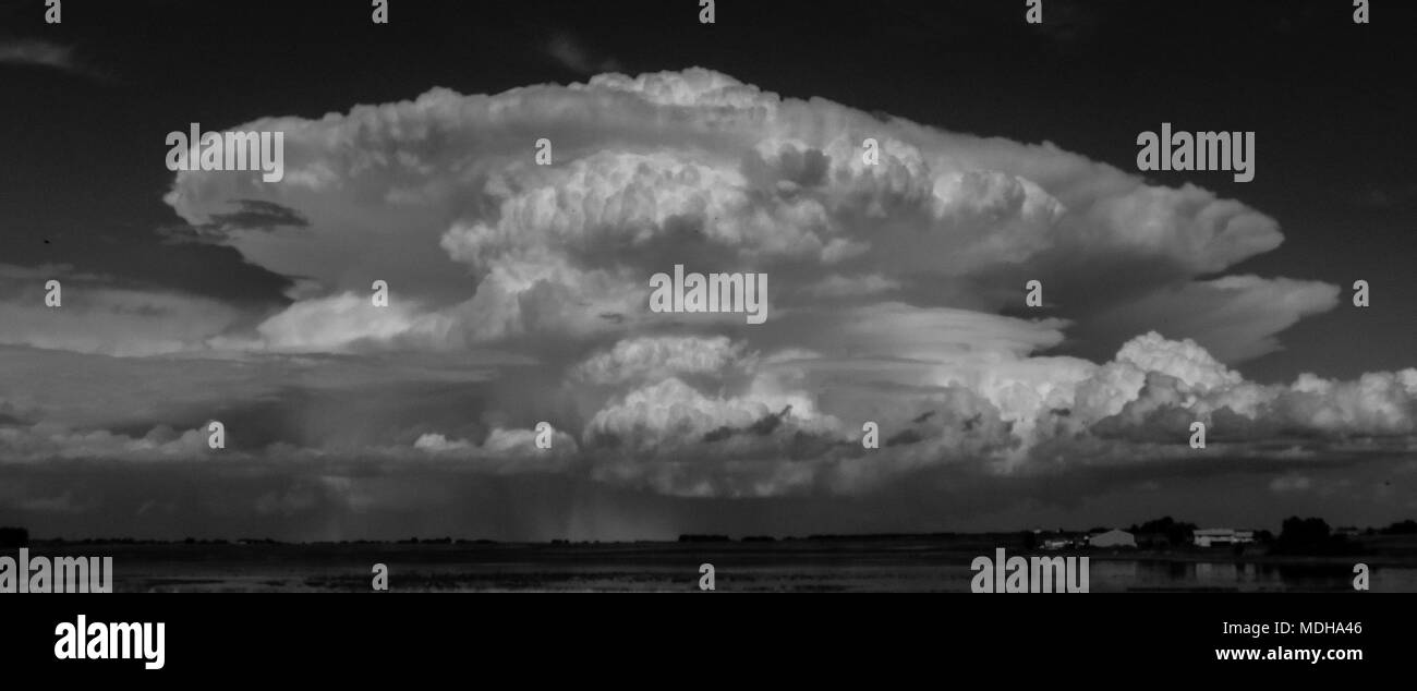 Cumulonimbus clouds rain Black and White Stock Photos & Images - Alamy