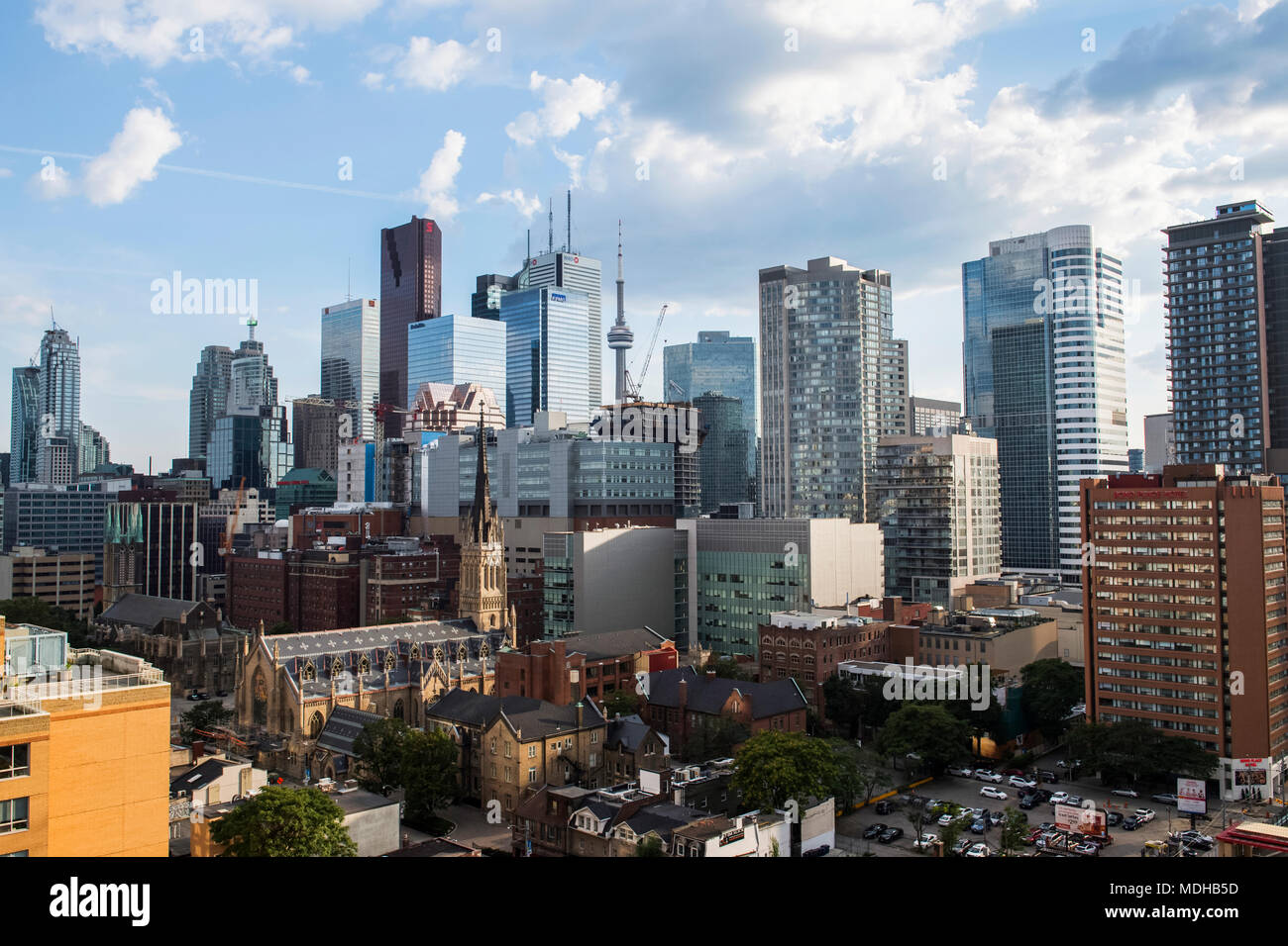 Toronto skyline in the morning under a blue sky with cloud; Toronto ...