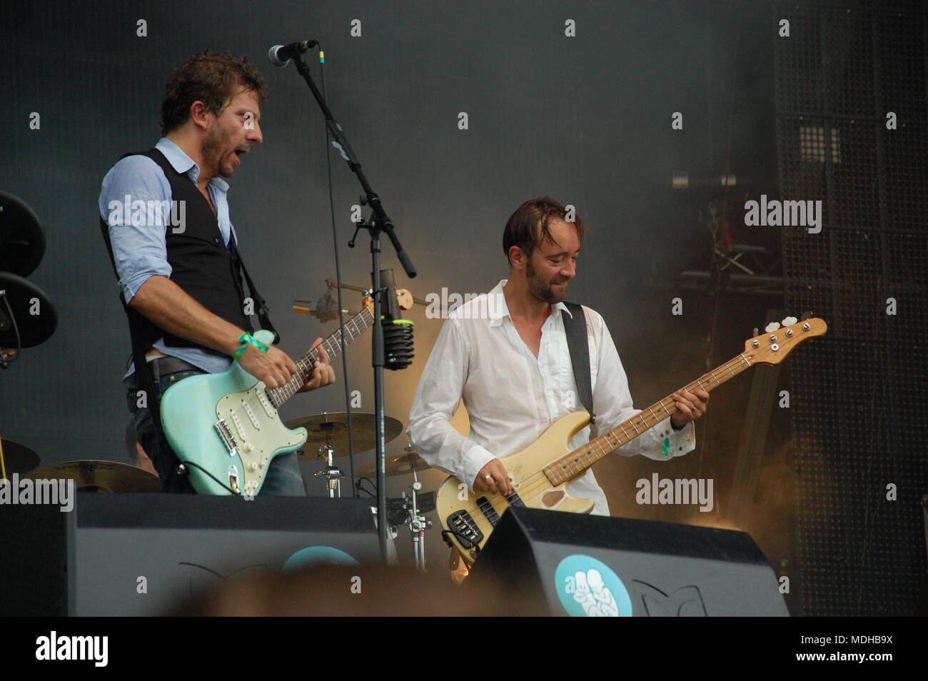 Tom Barman and Alan Gevaert singing and playing live with the Deus band ...