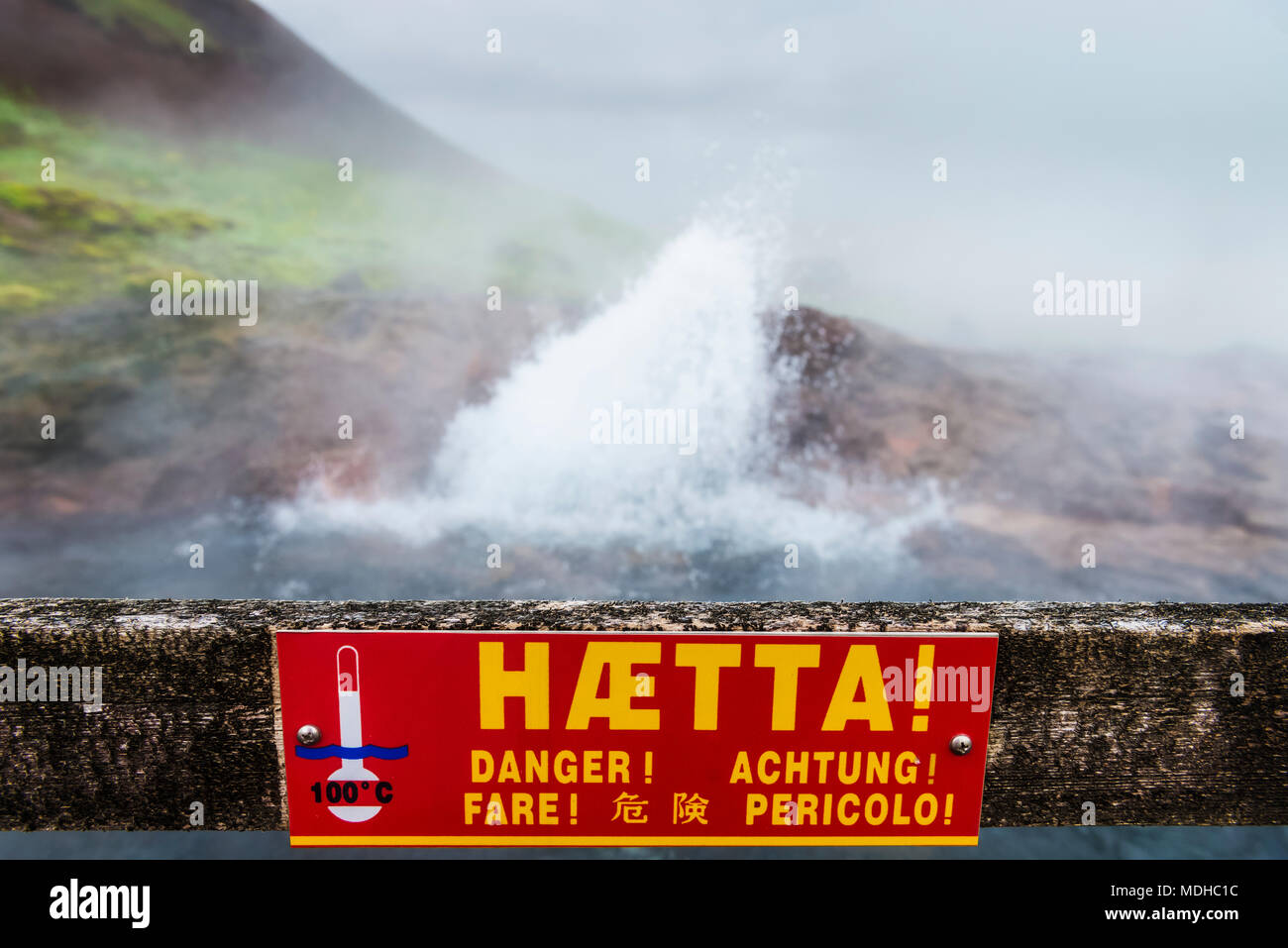 Warning sign in front of Europe's largest hot water spring ...