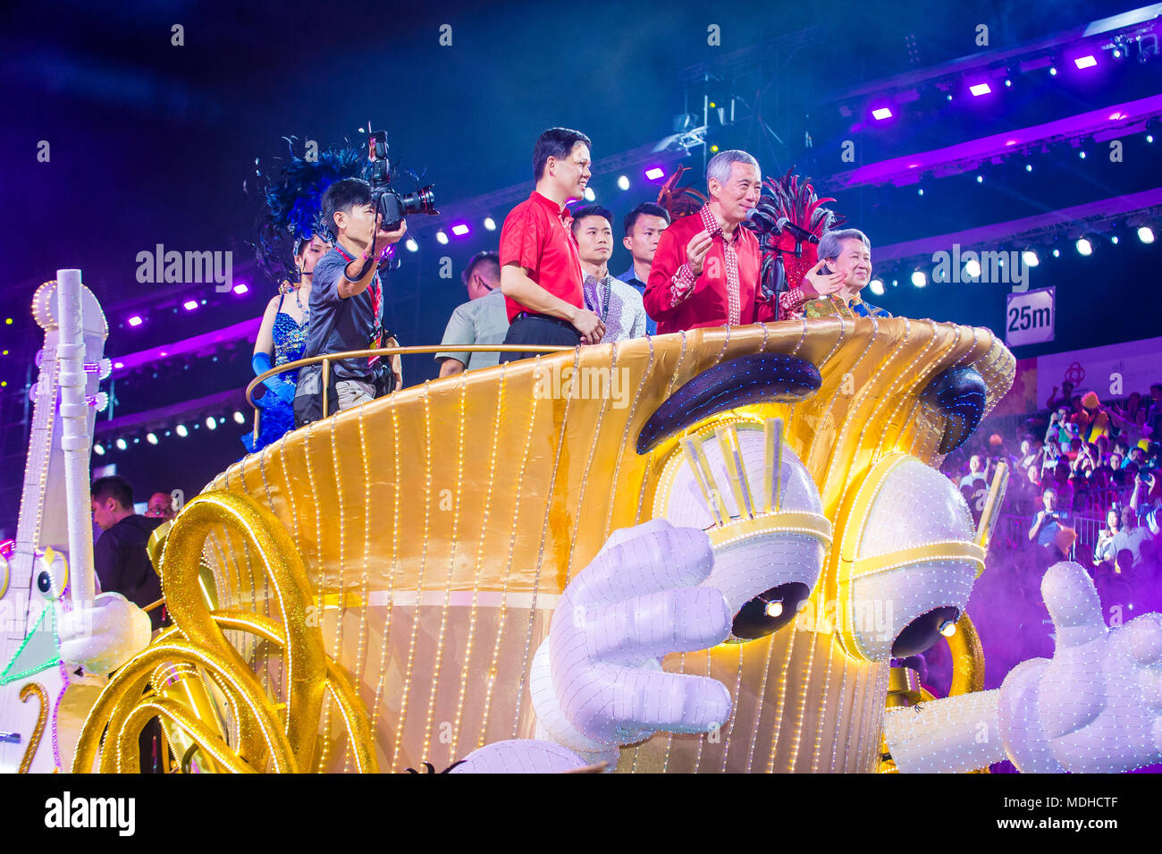 Singapore Prime Minister Lee Hsien Loong in a float procession during ...