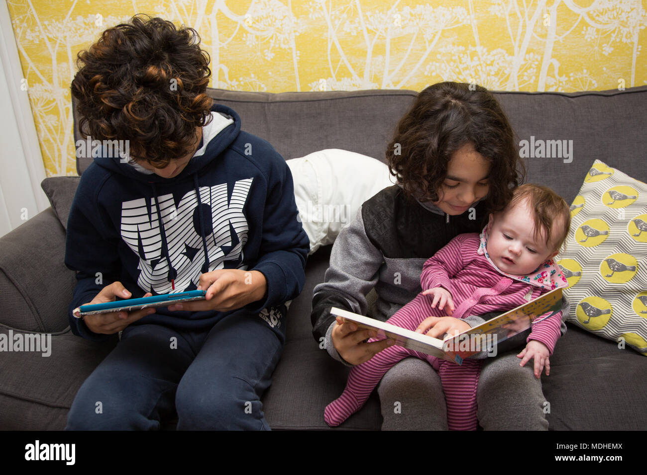 Looking after baby hi-res stock photography and images - Alamy