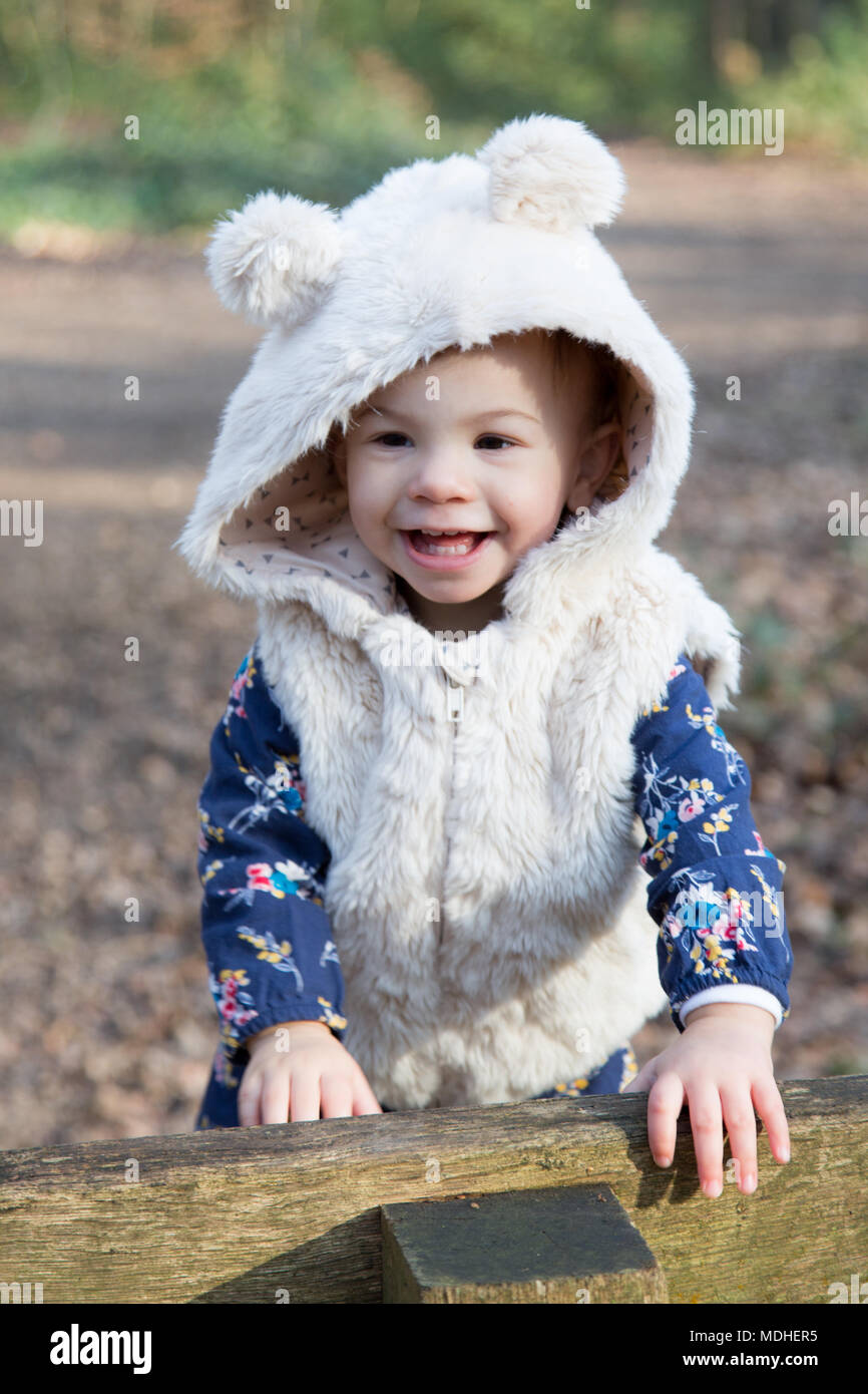 Happy toddler in woods Stock Photo - Alamy