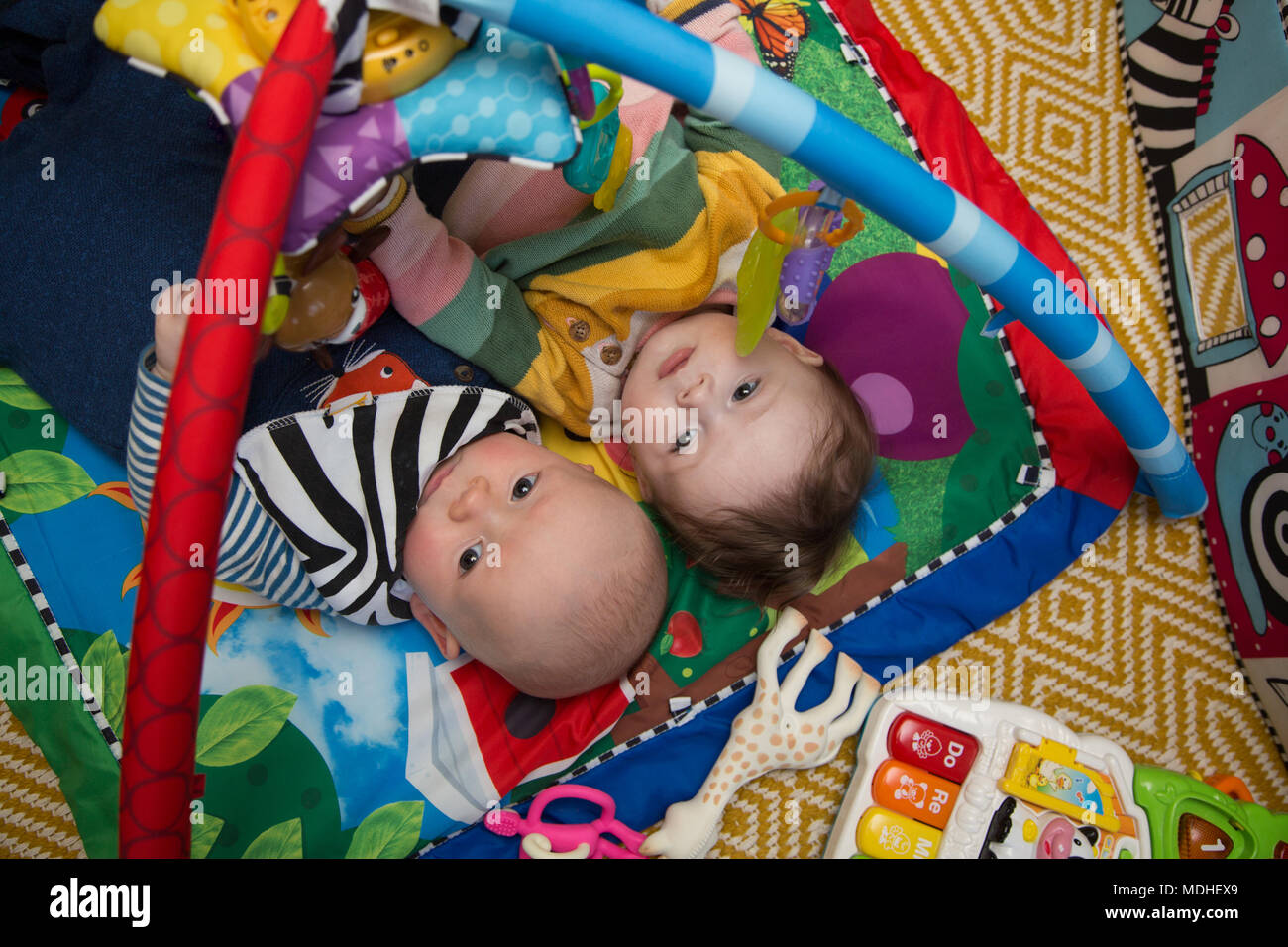 Children playing on mat hi-res stock photography and images - Alamy
