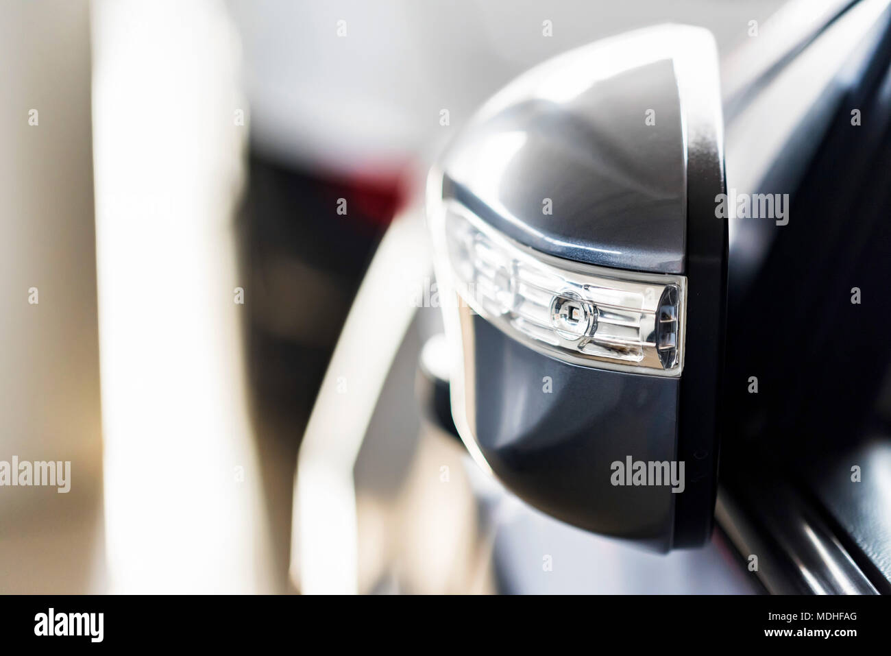 Folded side mirror of modern black car Stock Photo - Alamy