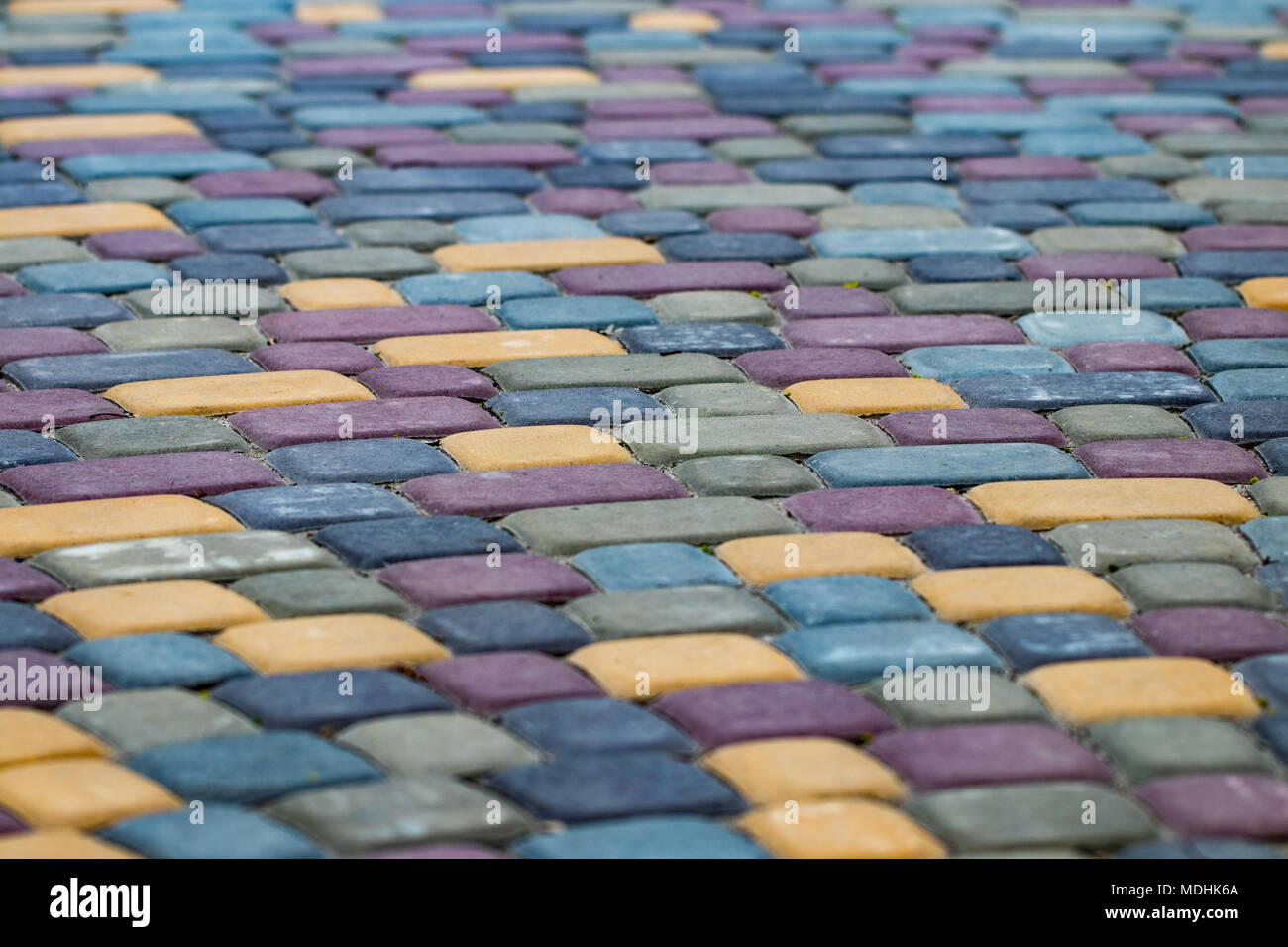 Interlocking paving with gray and white concrete blocks; Concrete products; Construction ...