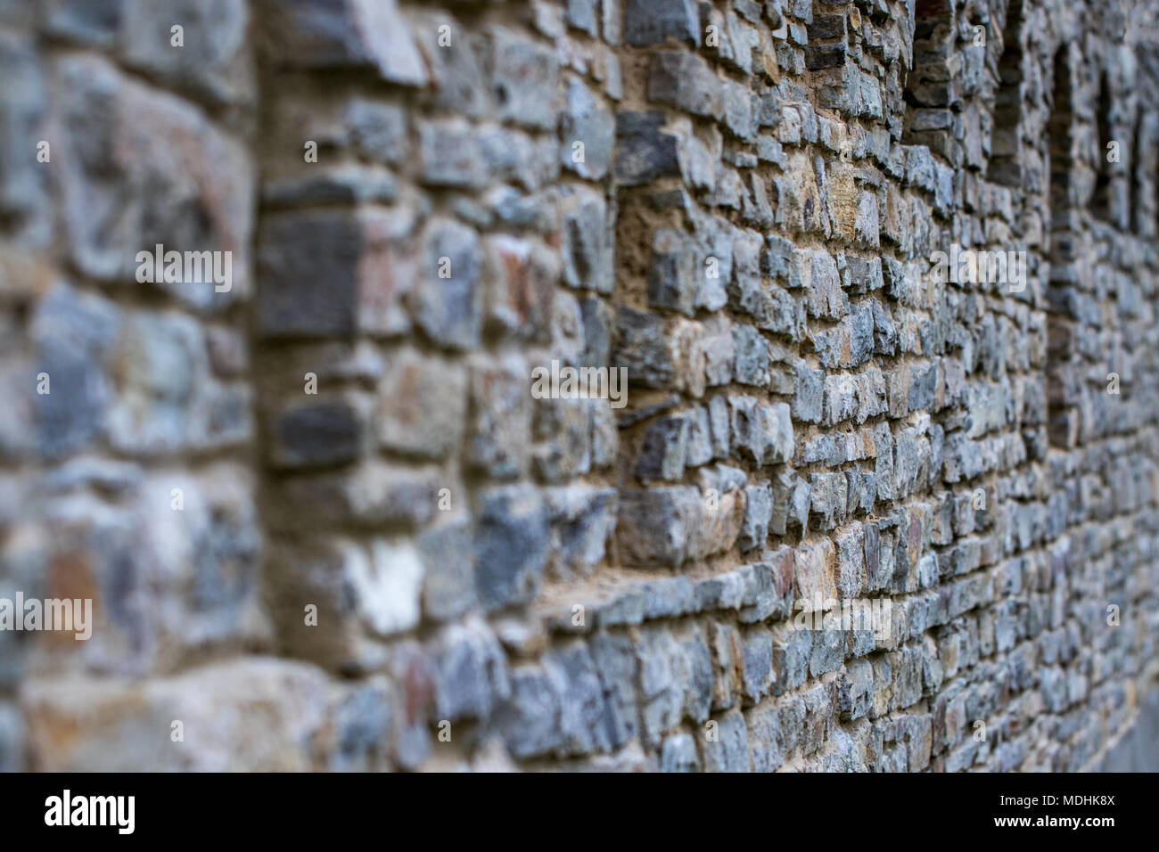 abstraction wall fence built of natural stone background Stock Photo ...