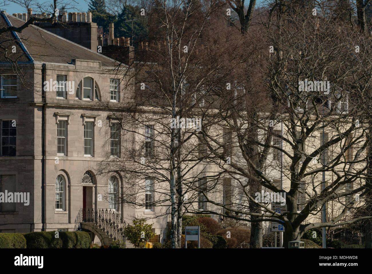 The Georgian terraces of Marshall Place overlook the parkland and trees ...