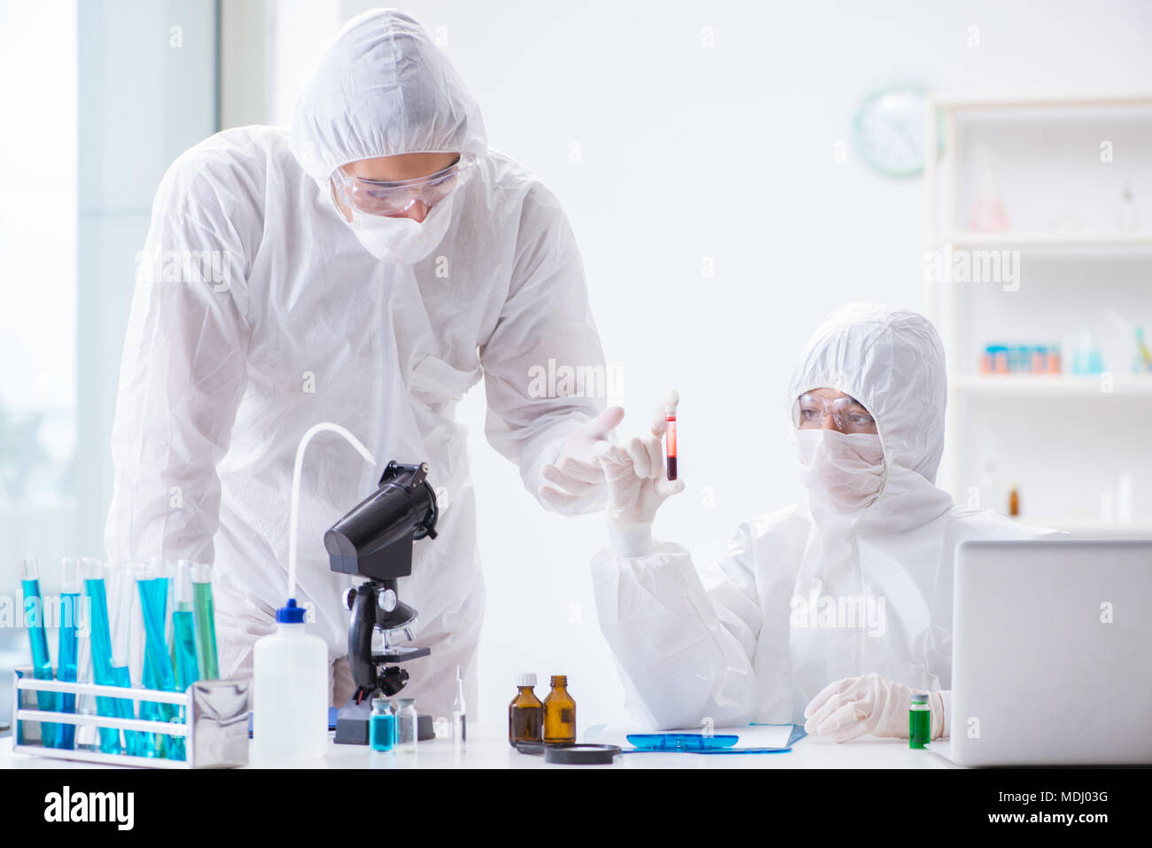 Two scientists working in the chemical lab Stock Photo - Alamy