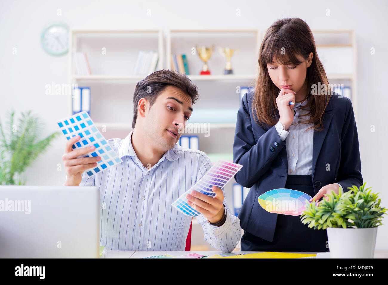 People discussing new design of project Stock Photo - Alamy