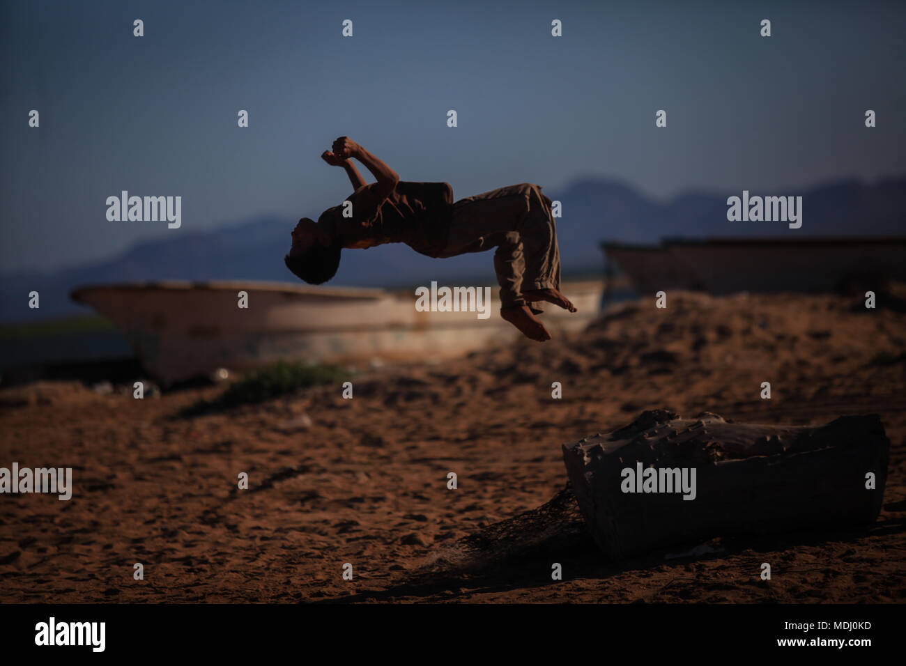 child of indigenous tribe Seri or Conca'ac, Concaac, jumps from a ...