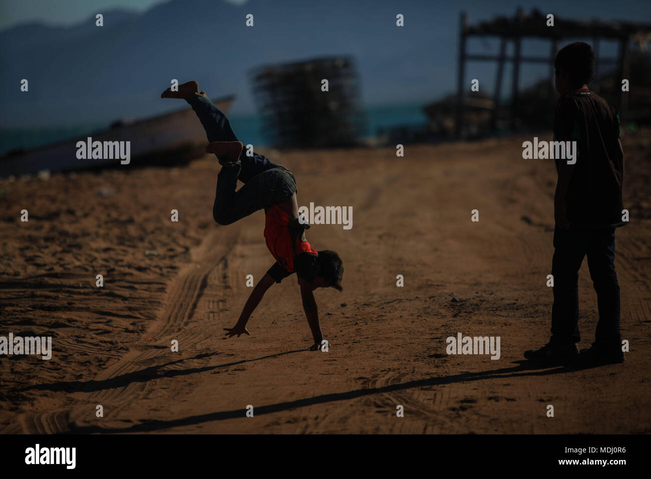 child of indigenous tribe Seri or Conca'ac, Concaac, jumps from a ...