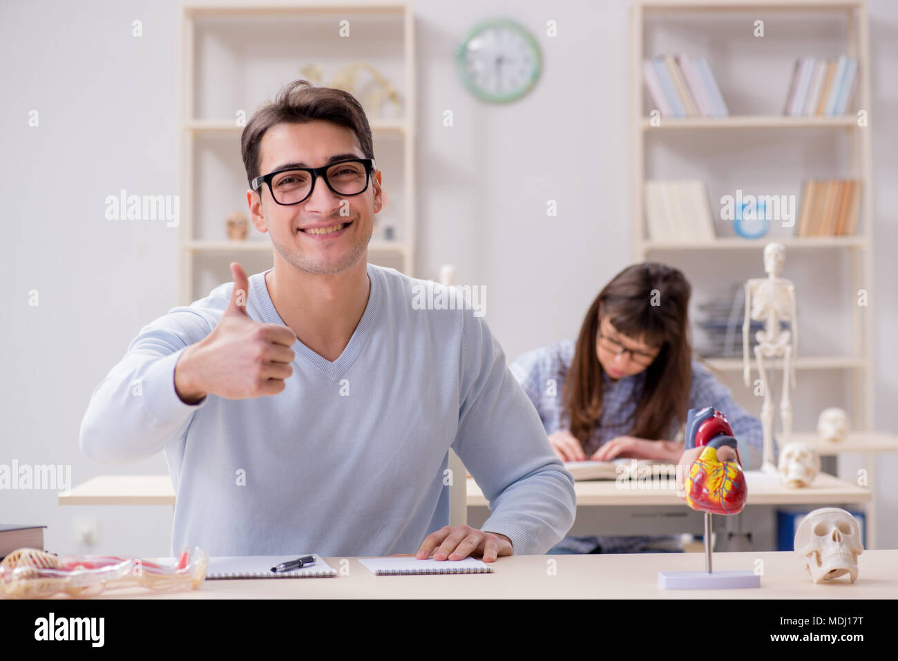 Two medical students studying in classroom Stock Photo - Alamy