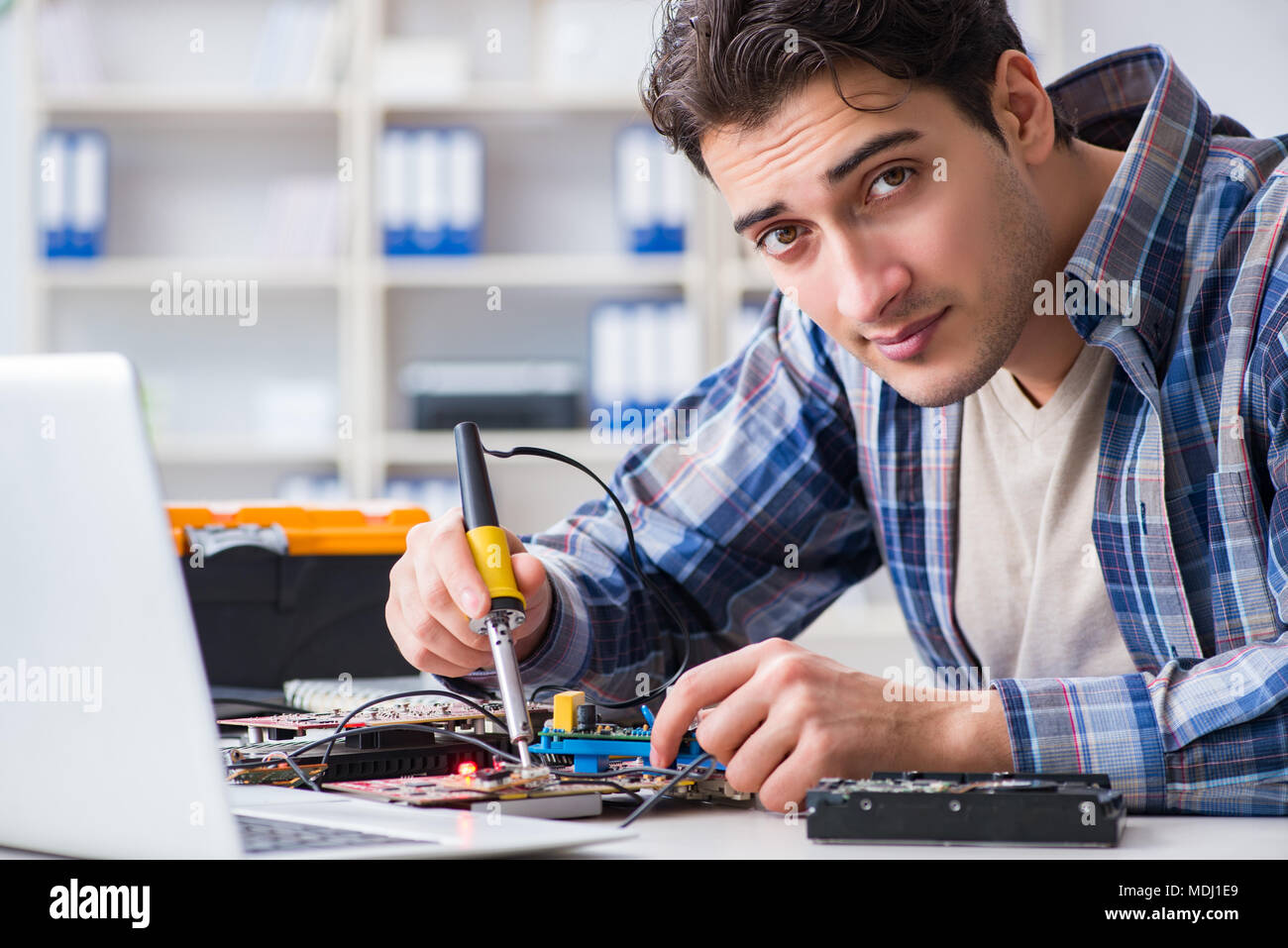Computer repair concept tweezers hi-res stock photography and images ...