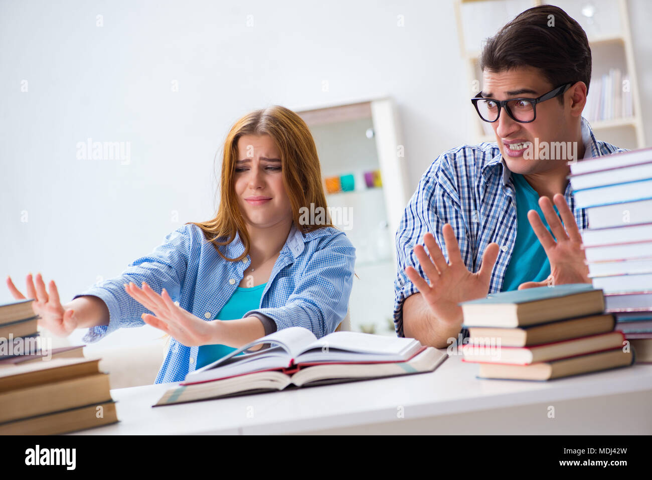 Pair of students studying for university exams Stock Photo - Alamy