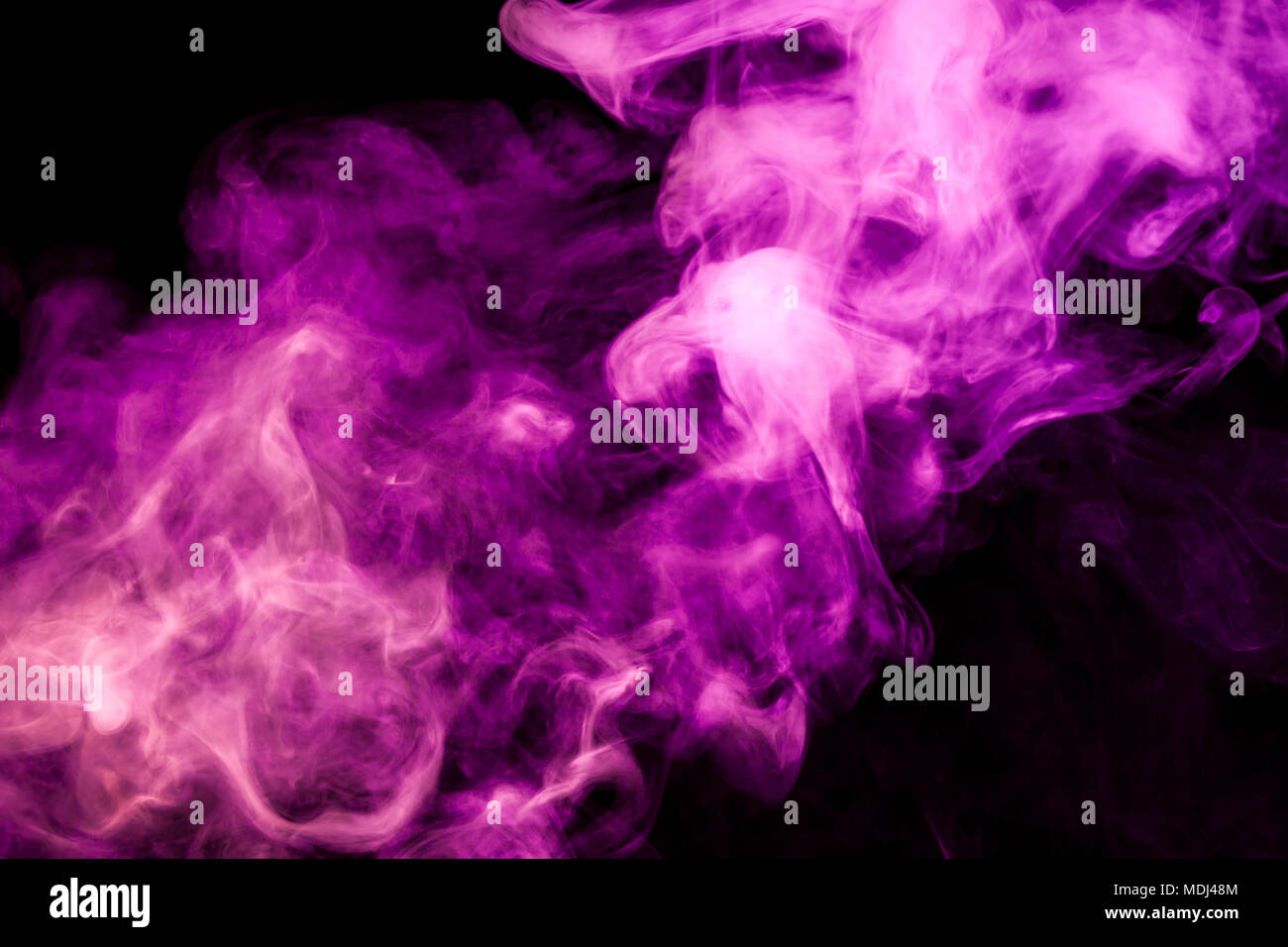 Colorful pink and red smoke on a black isolated background. Background ...