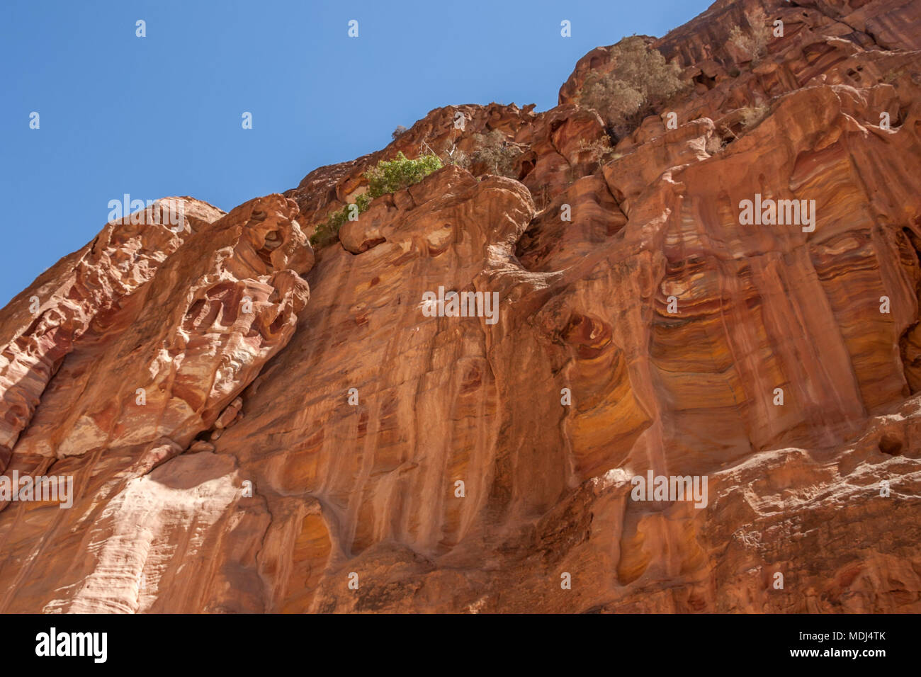 Rocks of pink sandstone in Petra, Jordan Stock Photo - Alamy