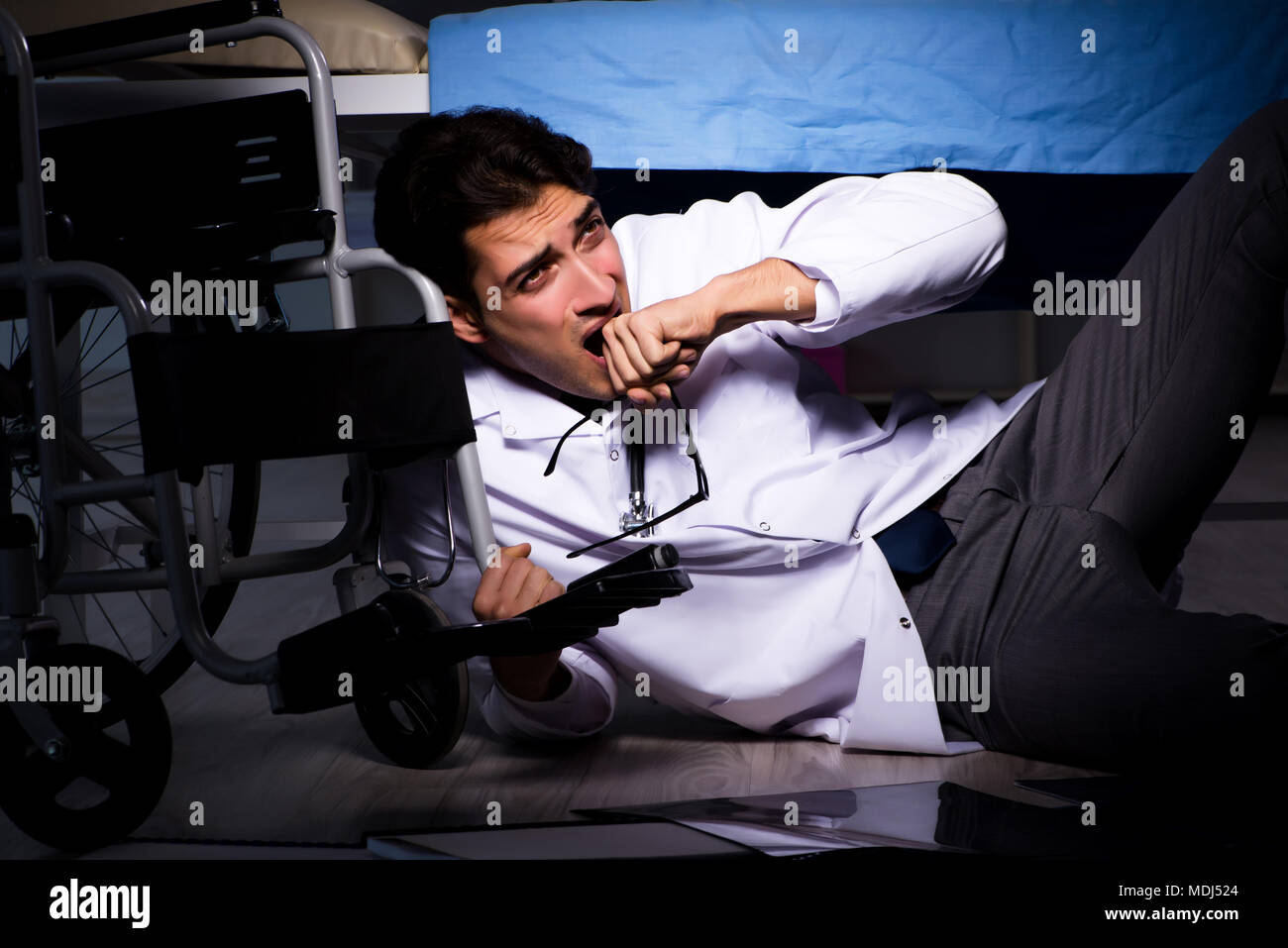 Patient yawning at doctor hi-res stock photography and images - Alamy