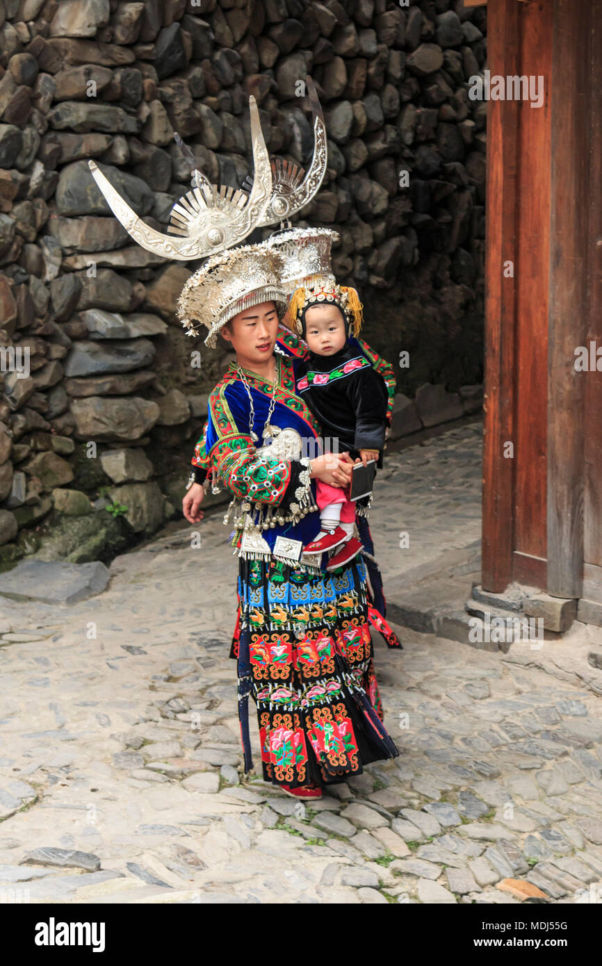 Langde, China - March 27, 2018: Miao woman wearing the traditional Miao ...