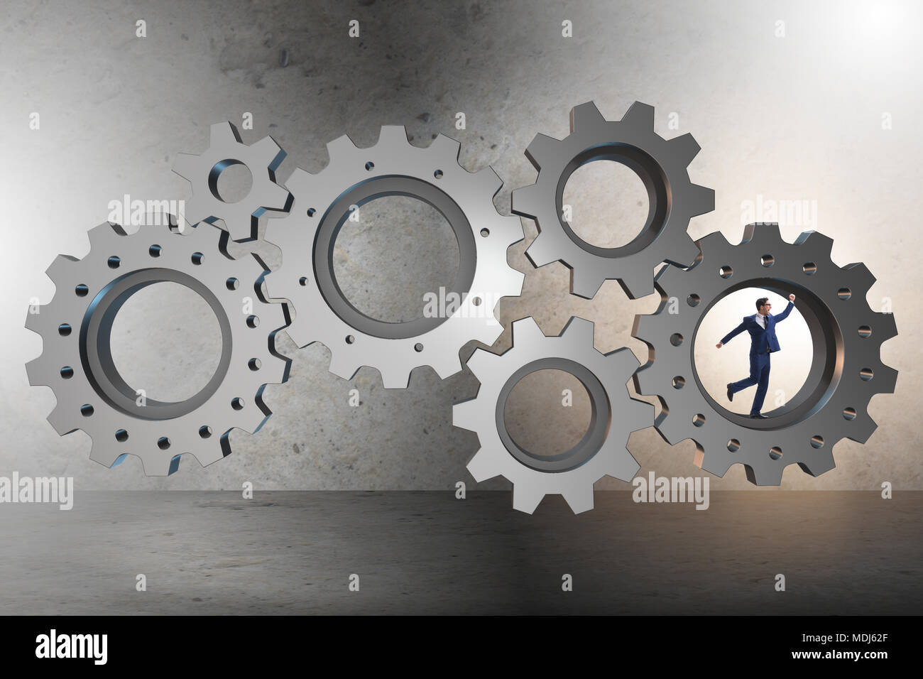 Teamwork concept with cogwheels and business people Stock Photo - Alamy