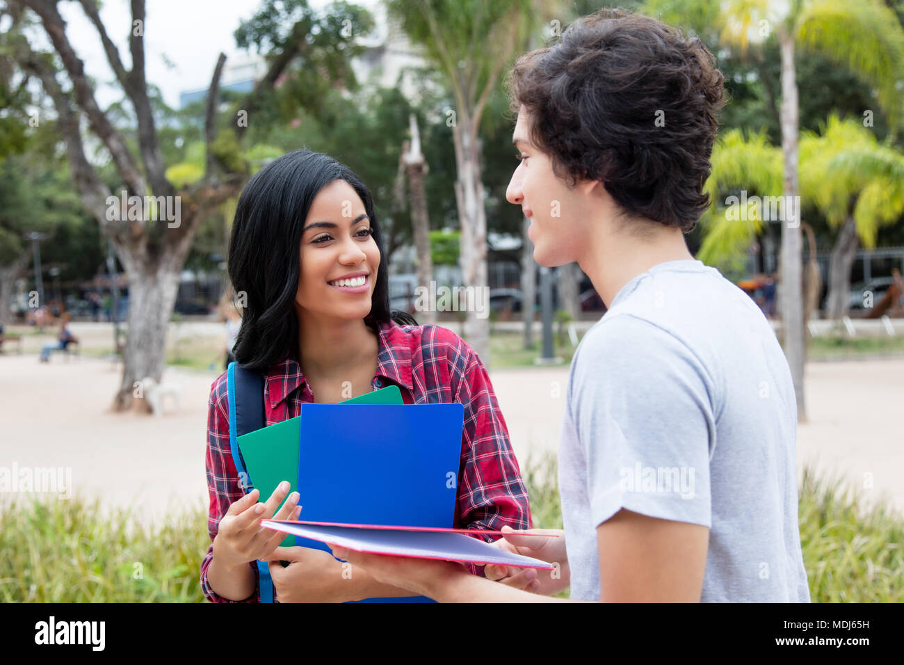 Two foreign people talking hi-res stock photography and images - Alamy