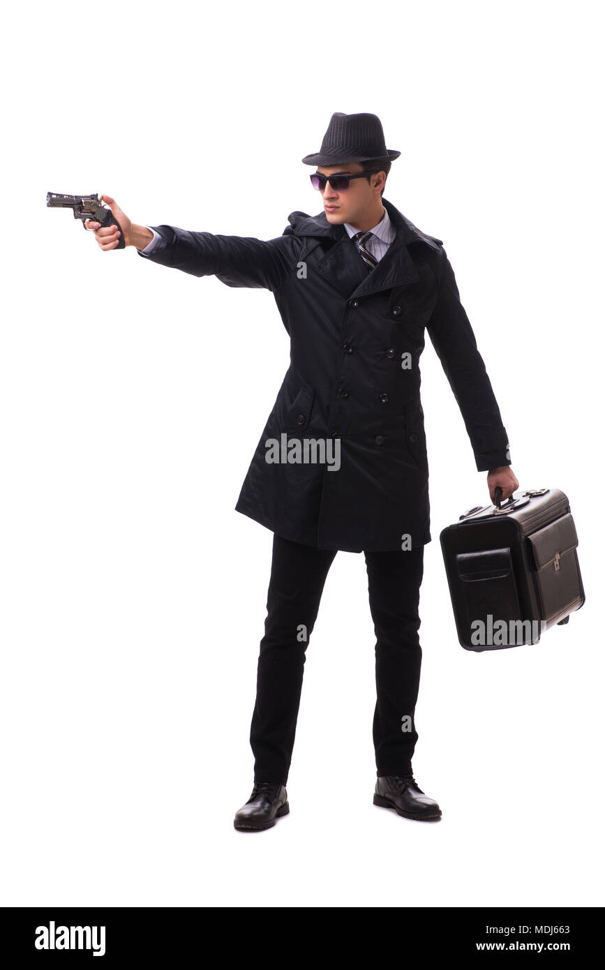 Man spy with handgun isolated on white background Stock Photo - Alamy