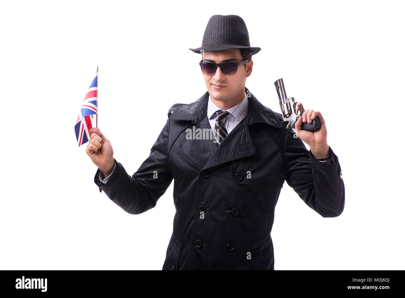 Man spy with handgun isolated on white background Stock Photo - Alamy