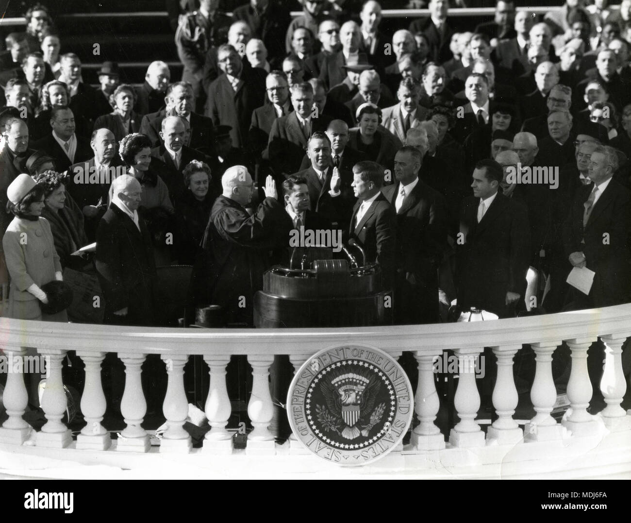 US President John F. Kennedy swearing to Earl Warren, USA 1961 Stock ...