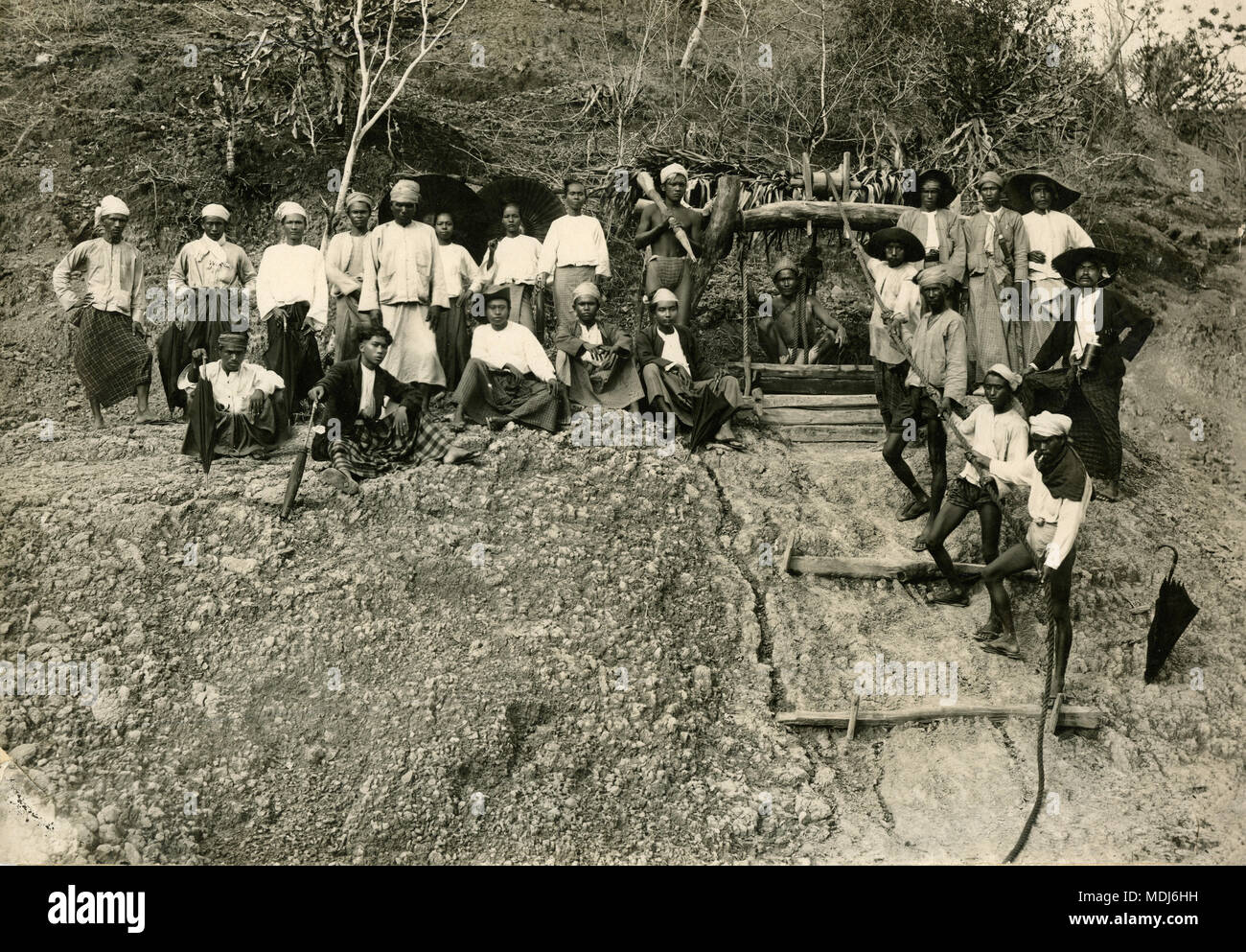 Indigenous workers around a primitive oil well, South America 1930s ...