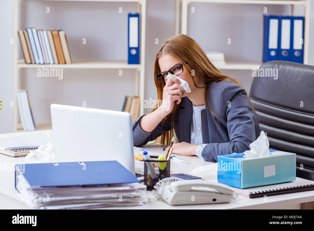 Businesswoman employee sick in the office Stock Photo - Alamy