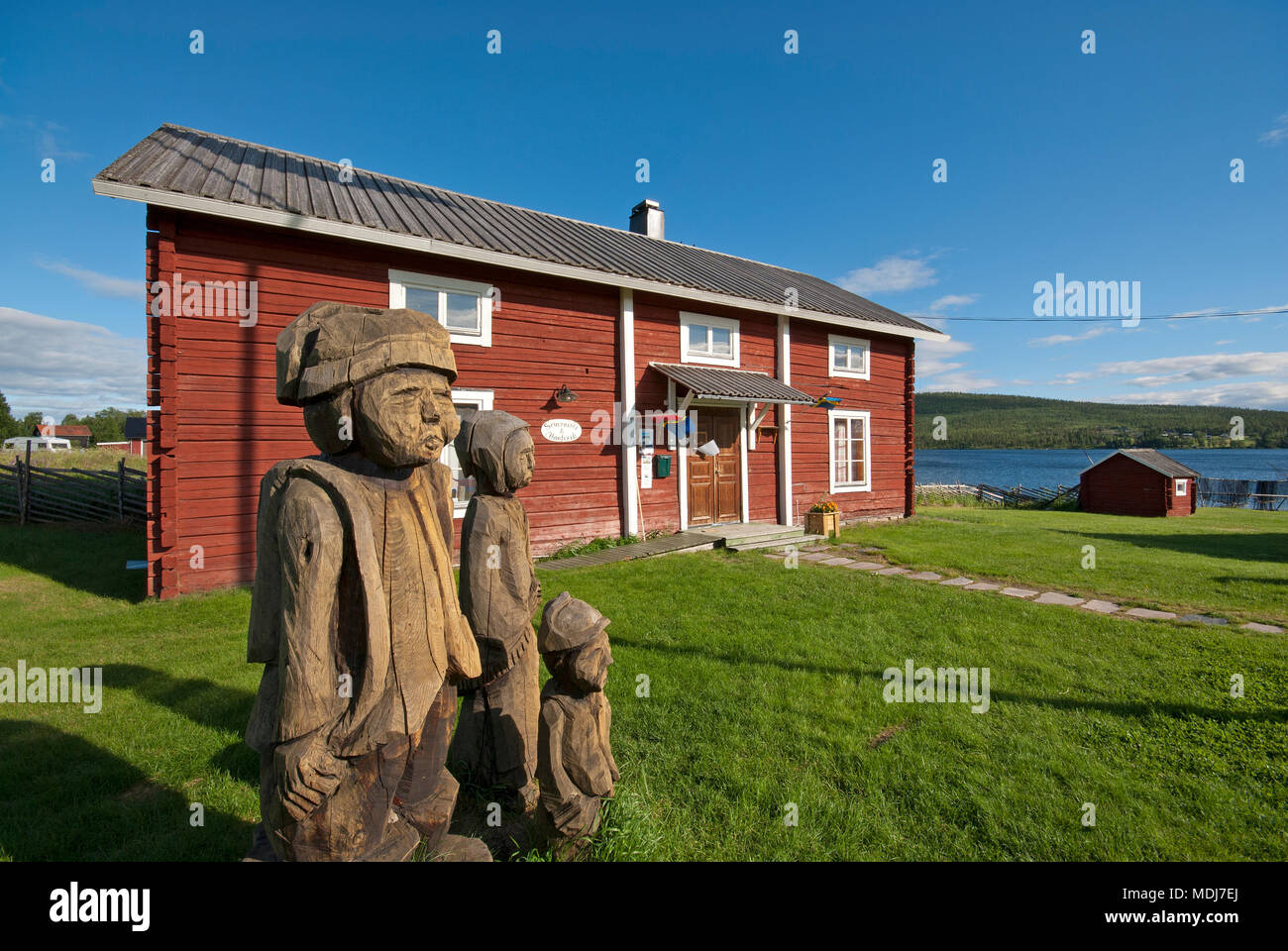 Wooden sculptures and buildings in Homestead Open-Air Museum ...
