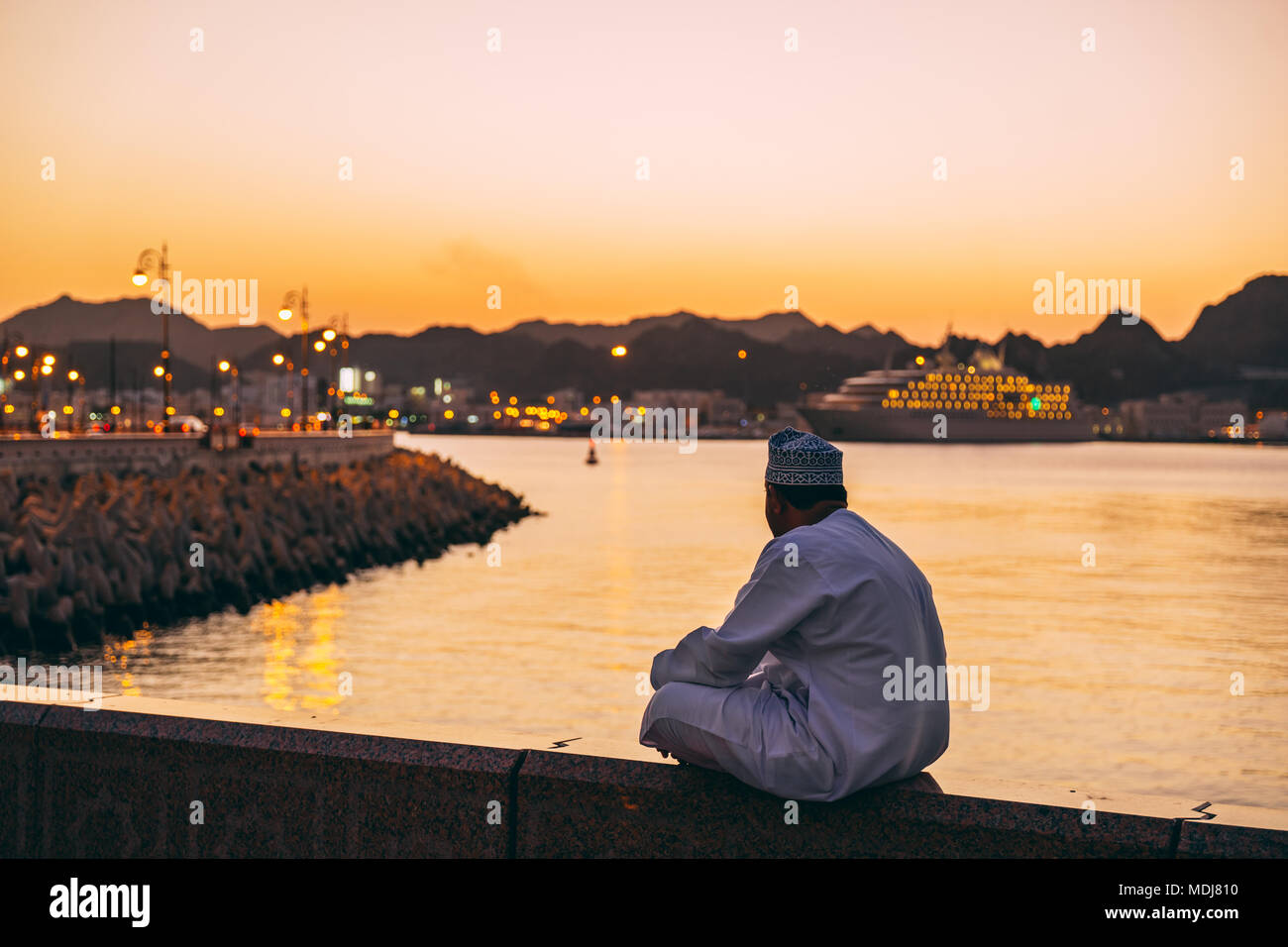 Beautiful sunset from the corniche in Muscat, Oman Stock Photo - Alamy