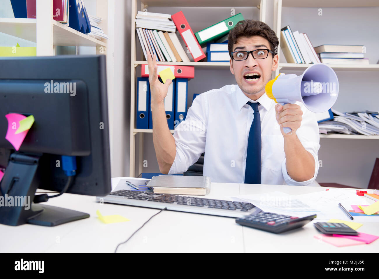Busy frustrated businessman angry in the office Stock Photo - Alamy