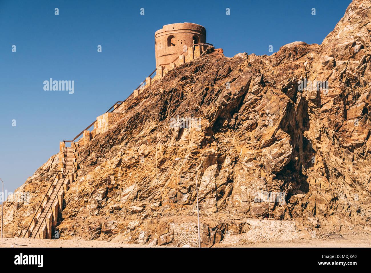 Defense tower along the corniche in Muscat, Oman Stock Photo - Alamy