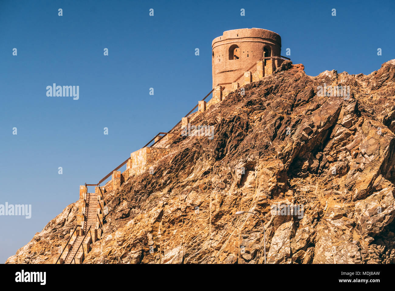 Defense tower along the corniche in Muscat, Oman Stock Photo - Alamy