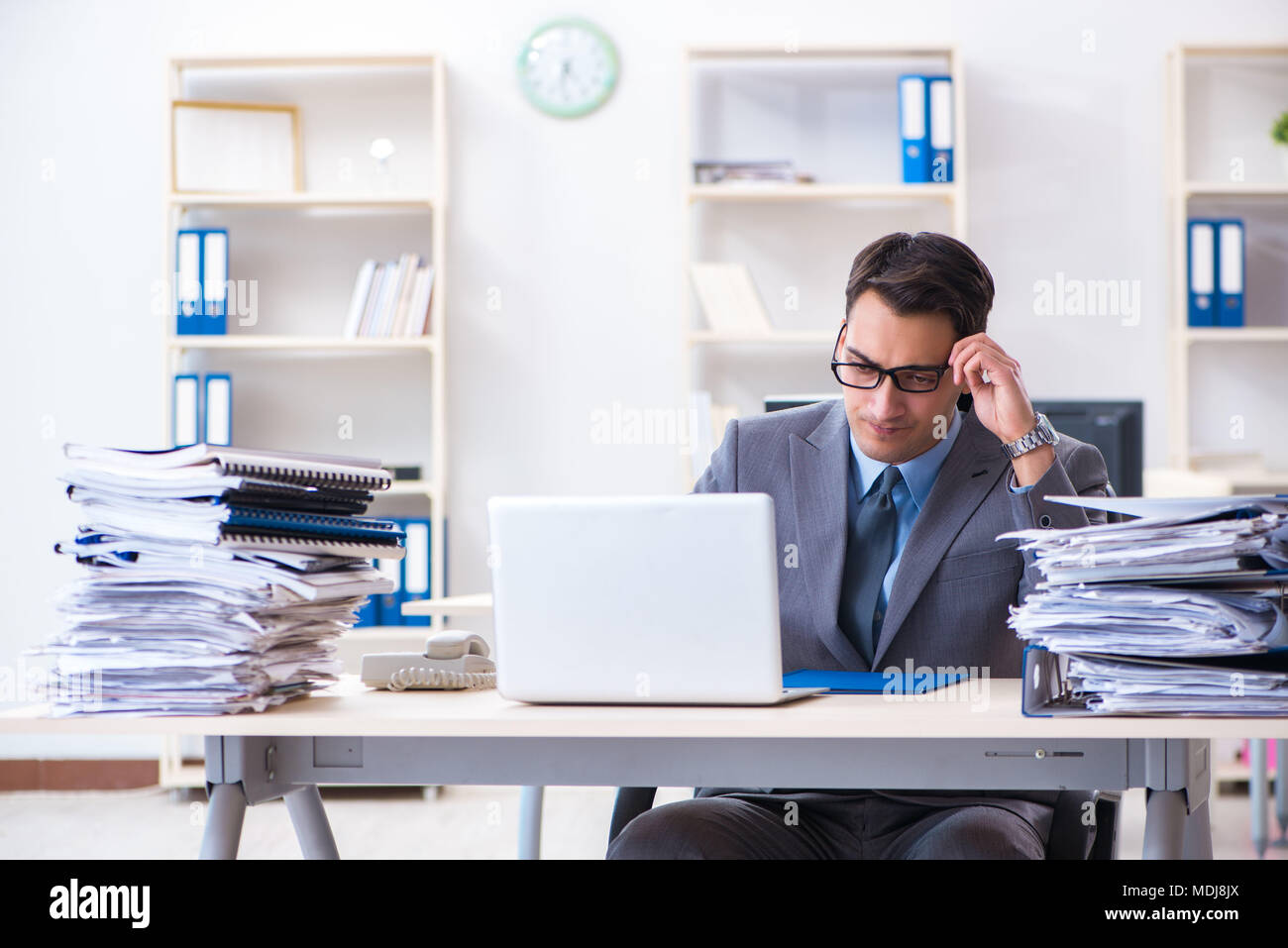 Overloaded work employee under hi-res stock photography and images - Alamy
