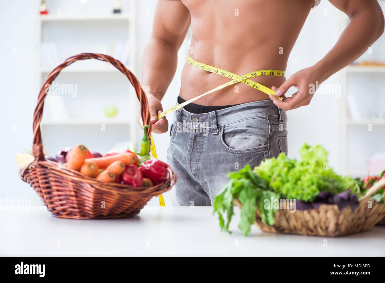 Young man in healthy eating and dieting concept Stock Photo - Alamy