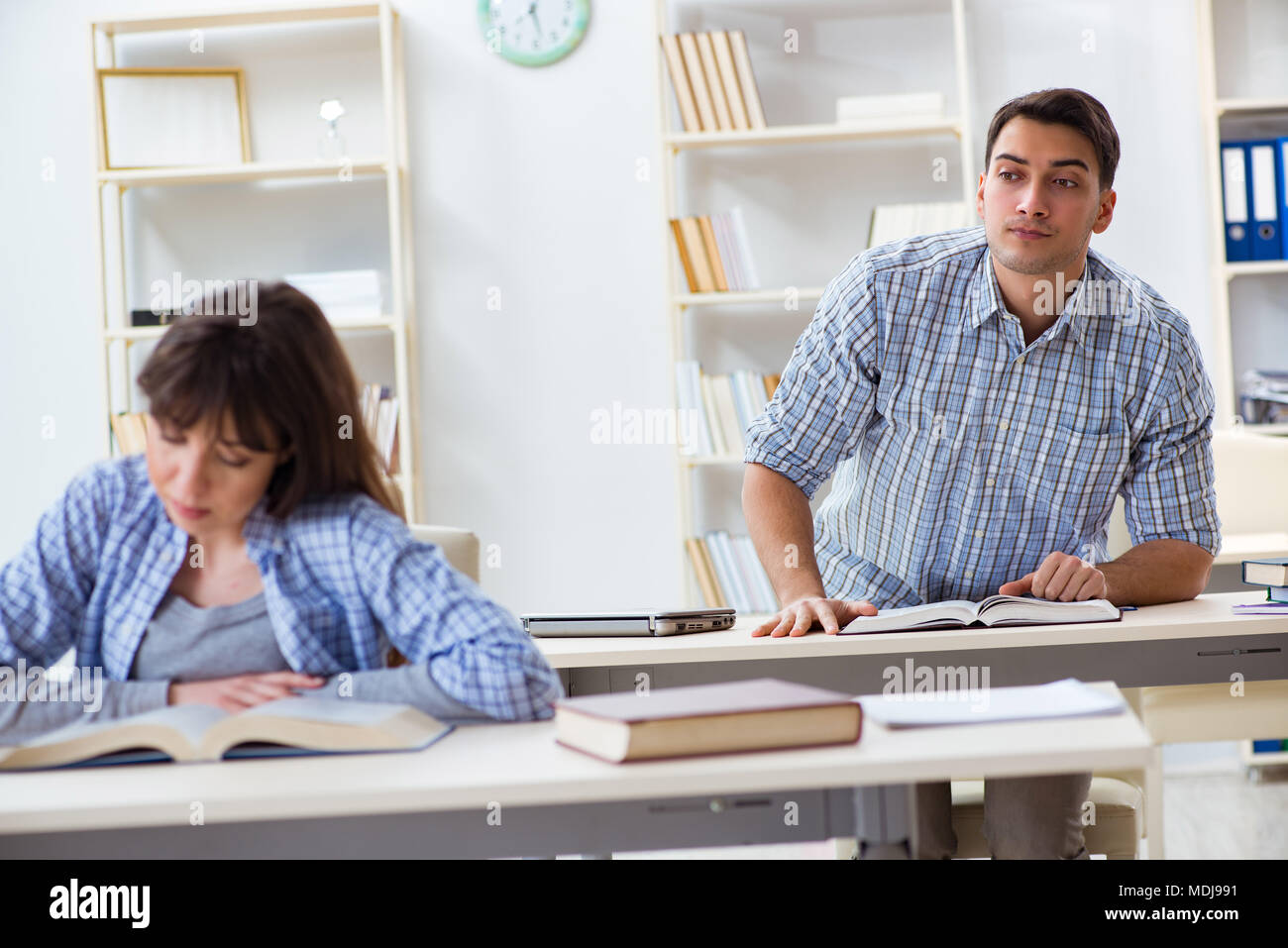 Students sitting and studying in classroom college Stock Photo - Alamy