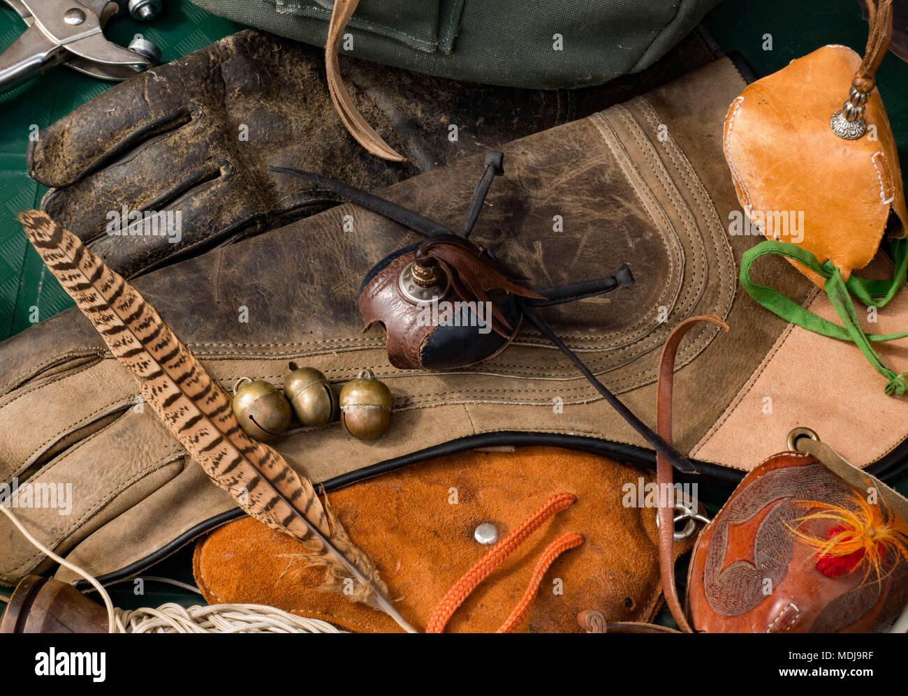 Collection of falconry items displayed on table. Wales Stock Photo - Alamy