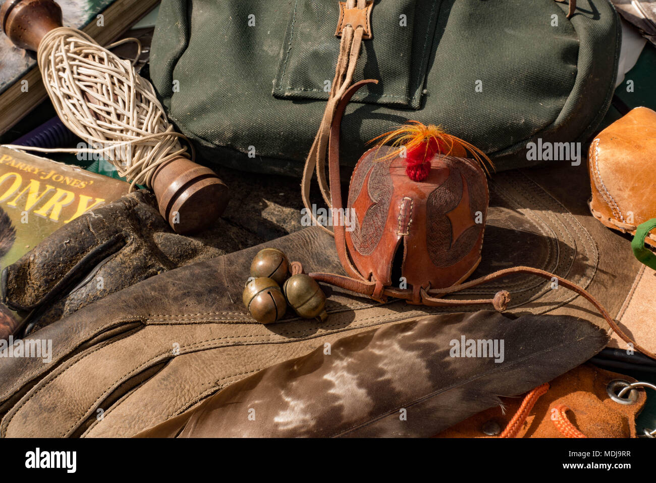 Collection of falconry items displayed on table. Wales Stock Photo - Alamy