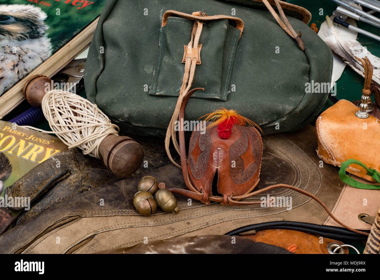Collection of falconry items displayed on table. Wales Stock Photo - Alamy