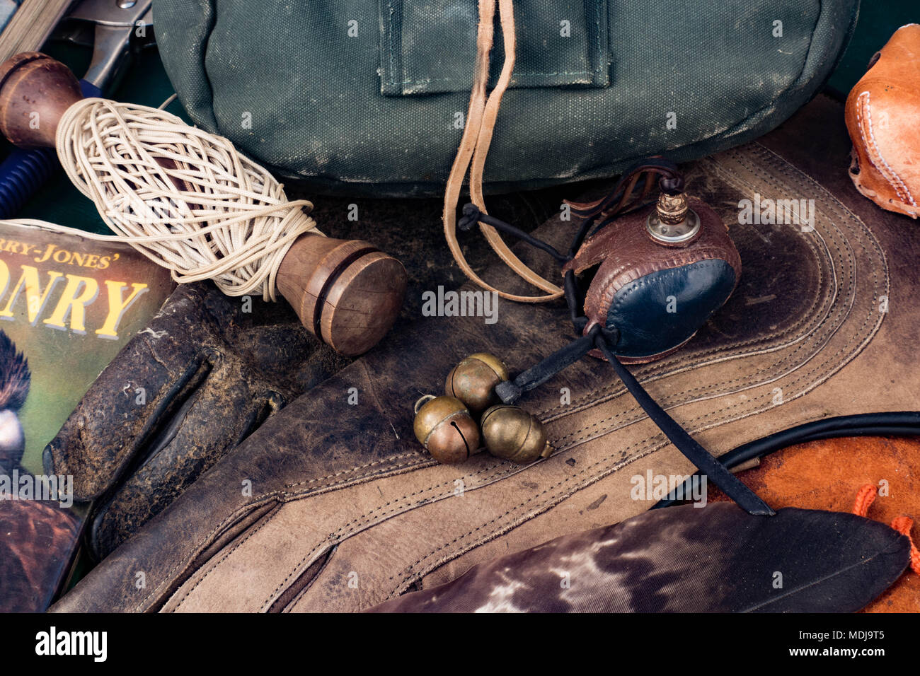 Collection of falconry items displayed on table. Wales Stock Photo - Alamy