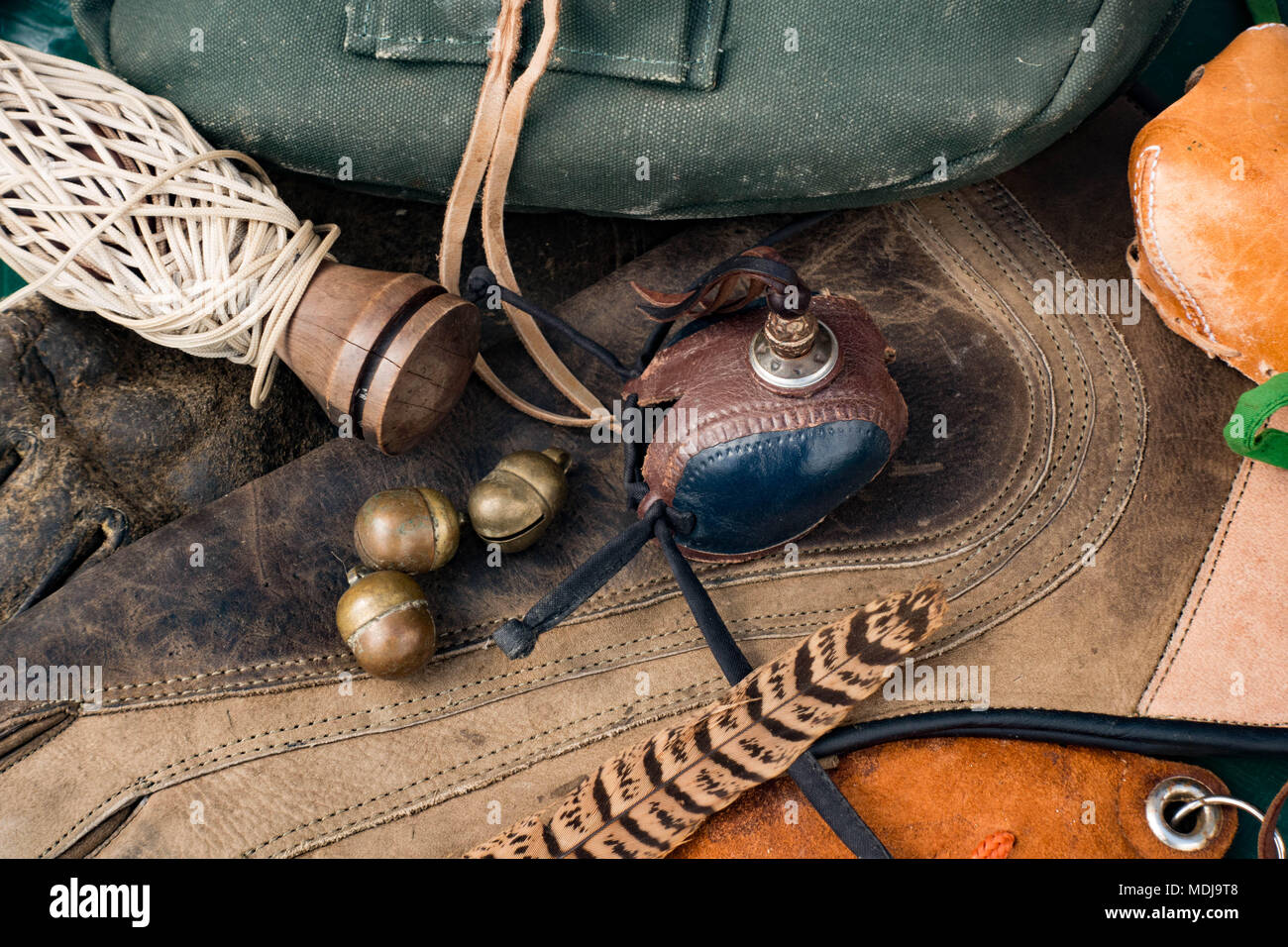 Collection of falconry items displayed on table. Wales Stock Photo - Alamy