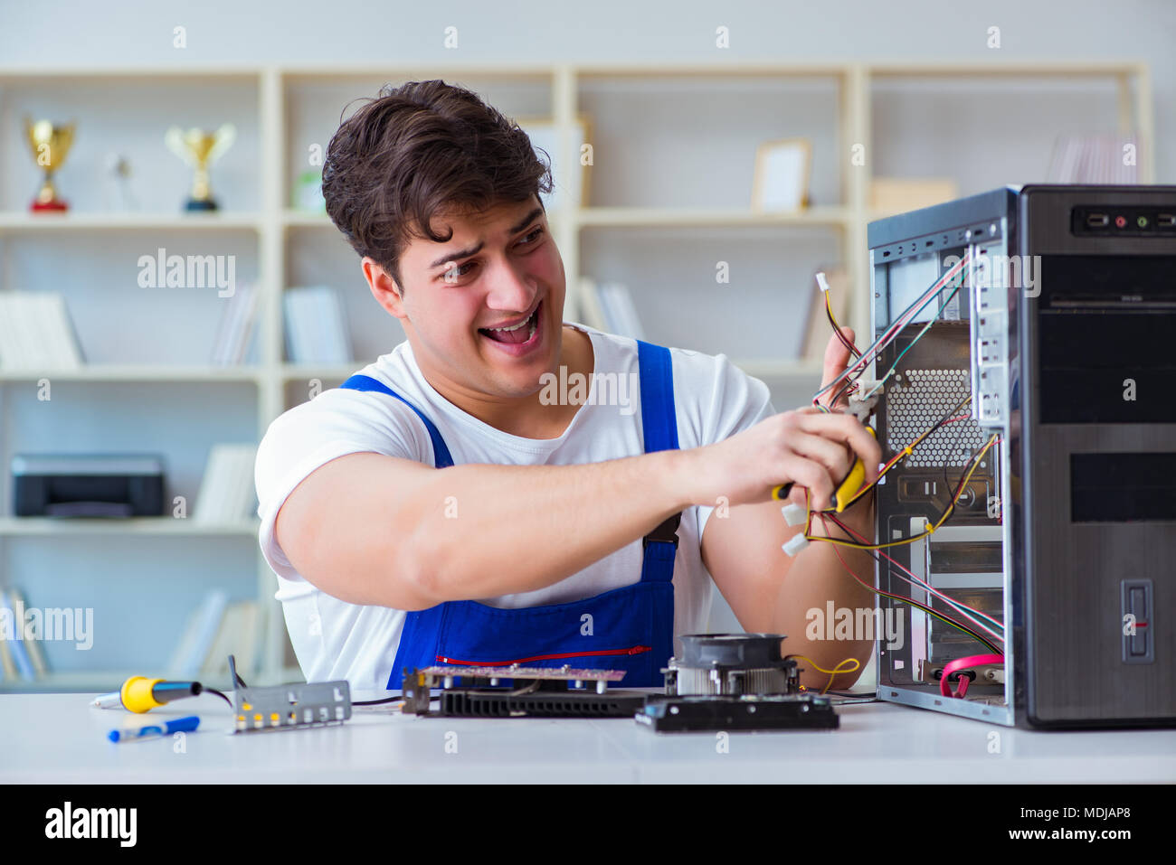 Computer hardware repair and fixing concept by experienced technician ...