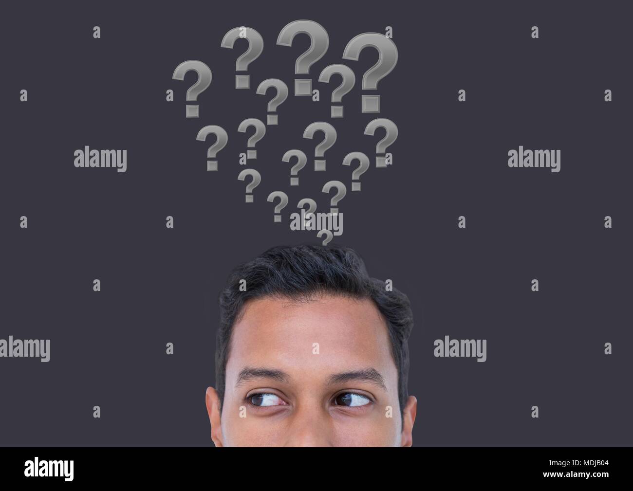 Man with grey question marks emerging from head Stock Photo - Alamy