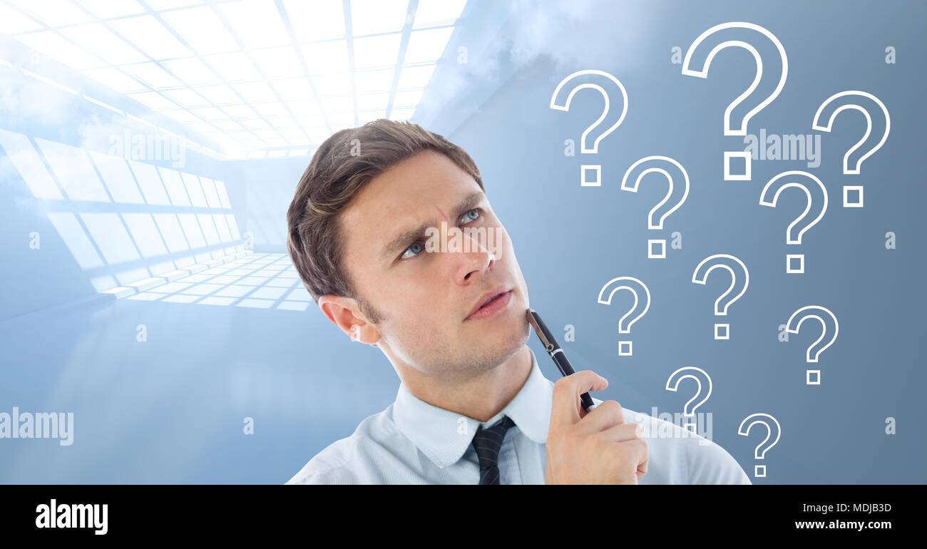 Man thinking with question marks Stock Photo - Alamy
