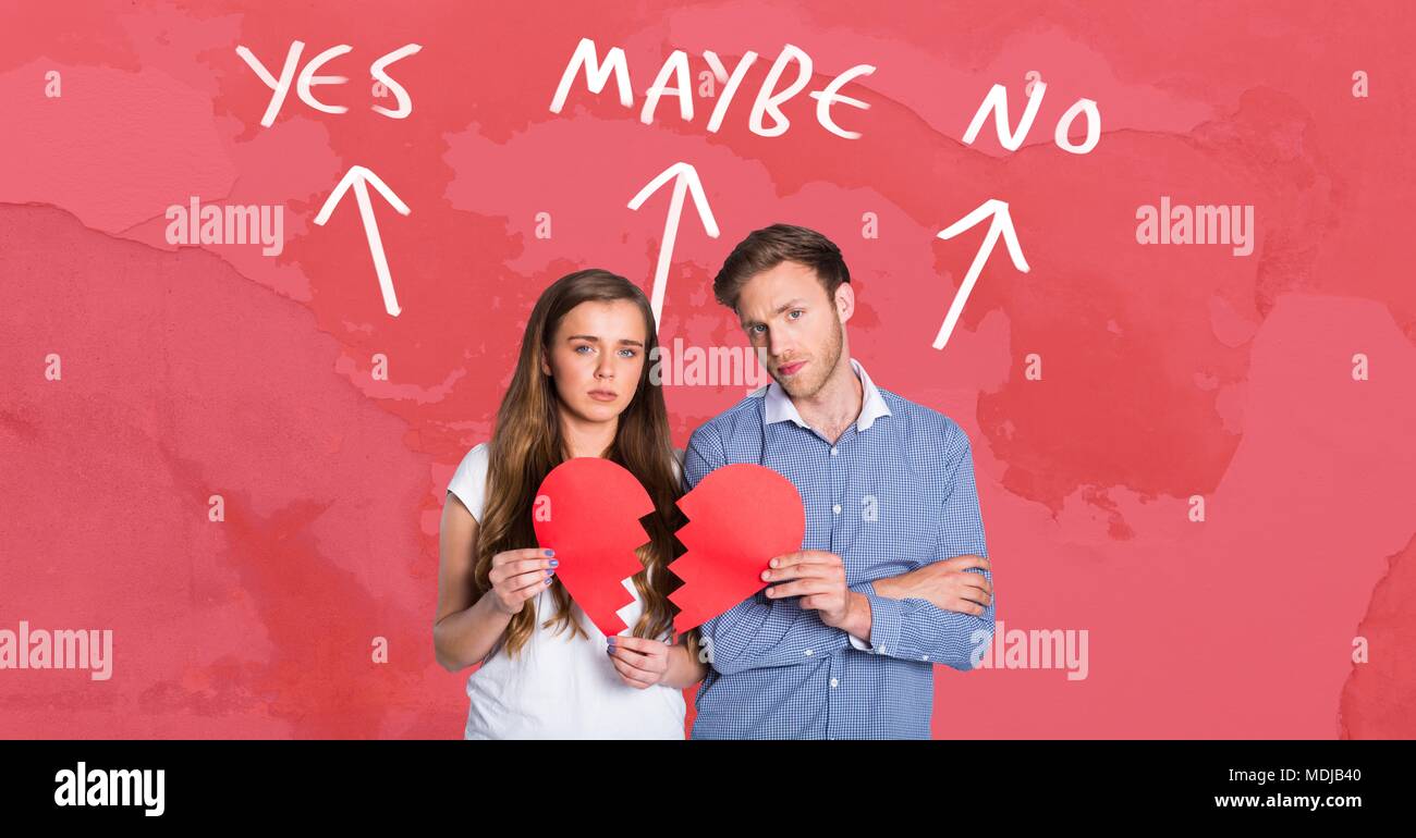 Couple holding broken heart with yes no maybe writing in background ...