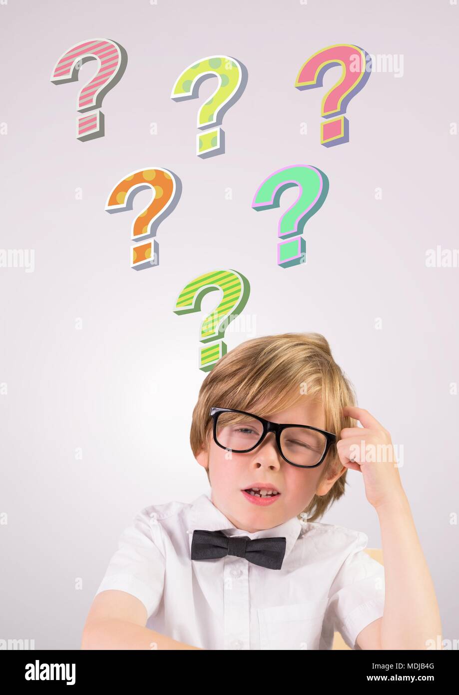 Boy thinking with colorful funky question marks Stock Photo - Alamy